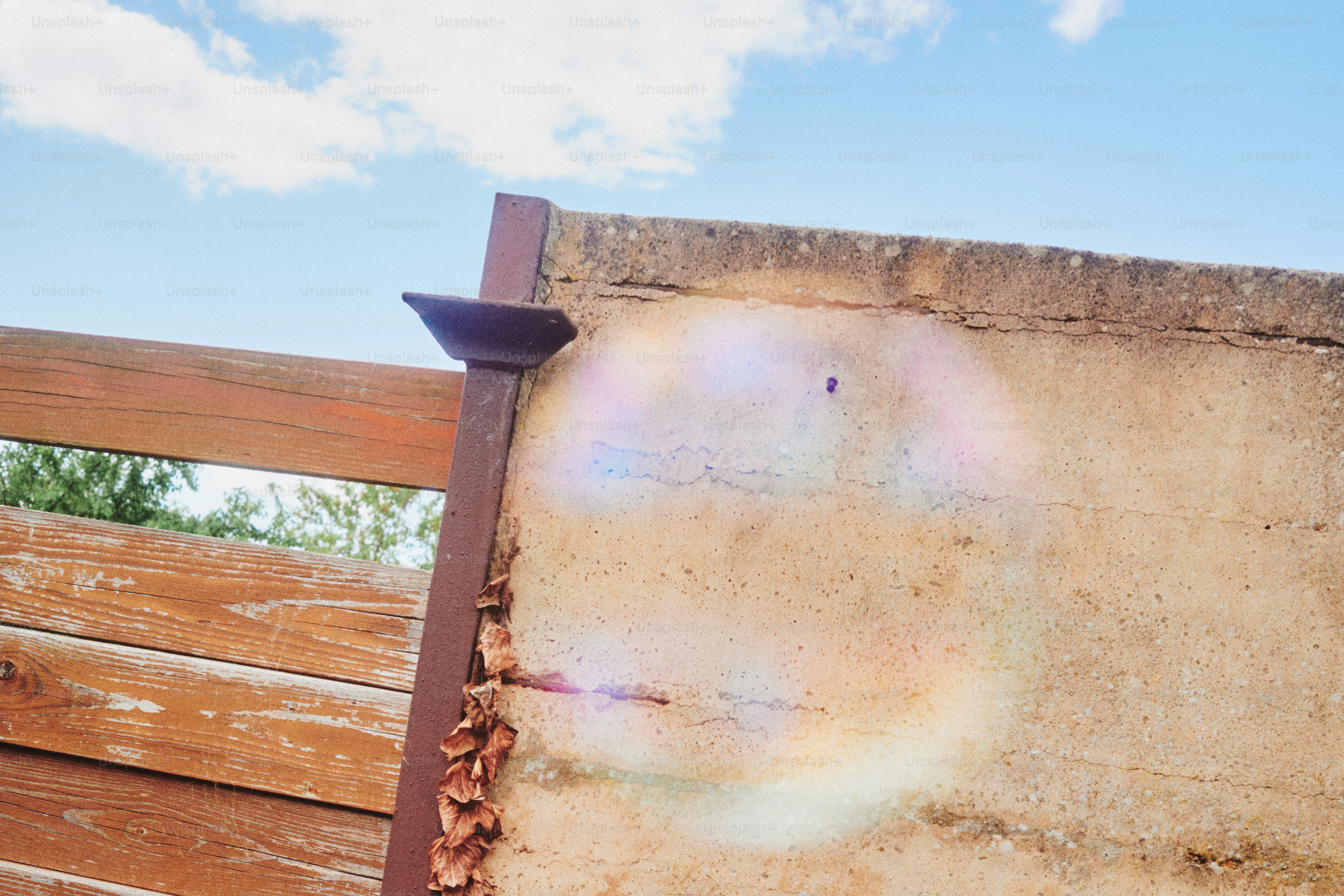 A fence with details against the blue sky. photo – Bubbles Image on ...