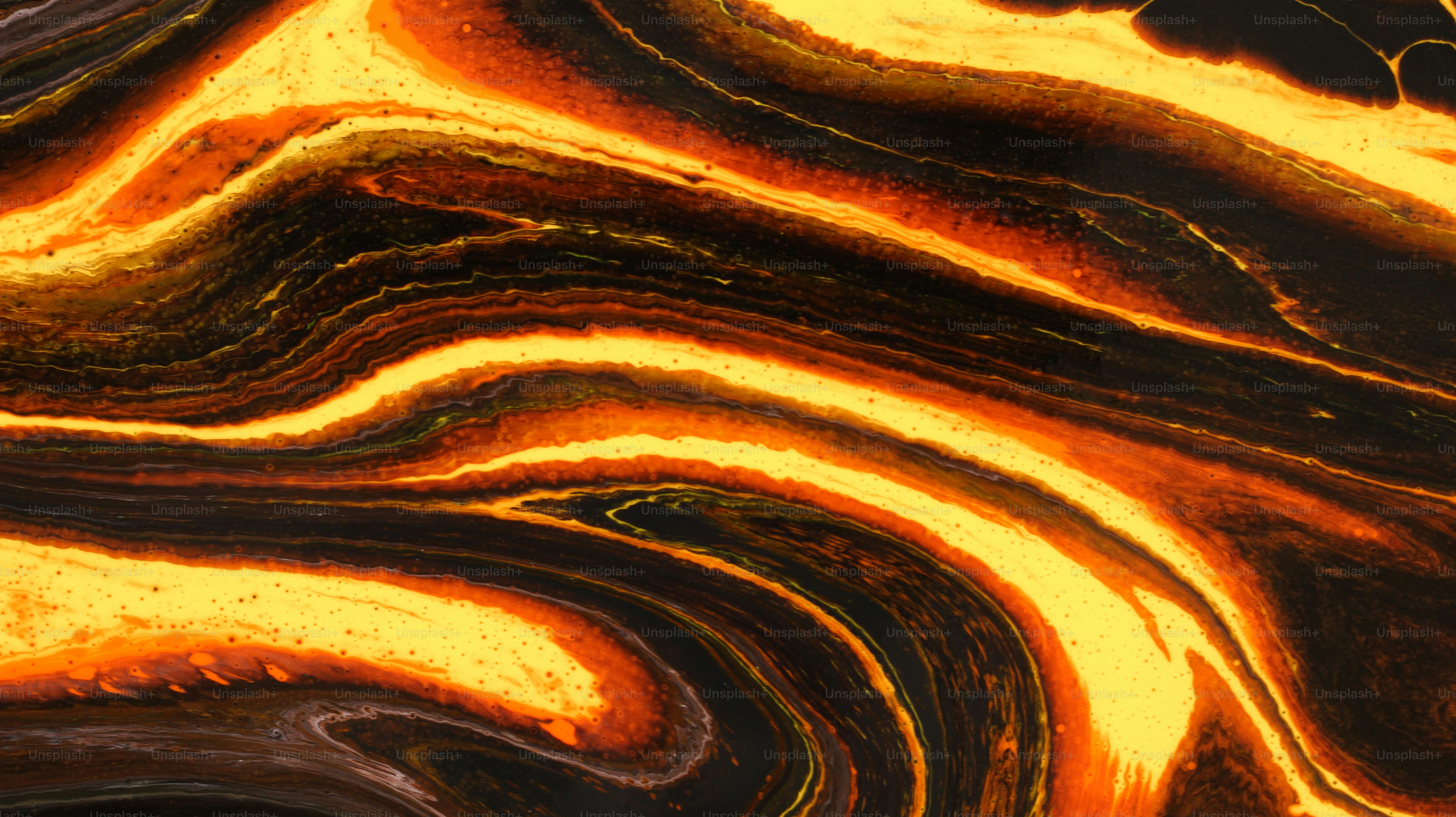 Lava swirls and flows in fiery patterns. photo – Background Image on ...