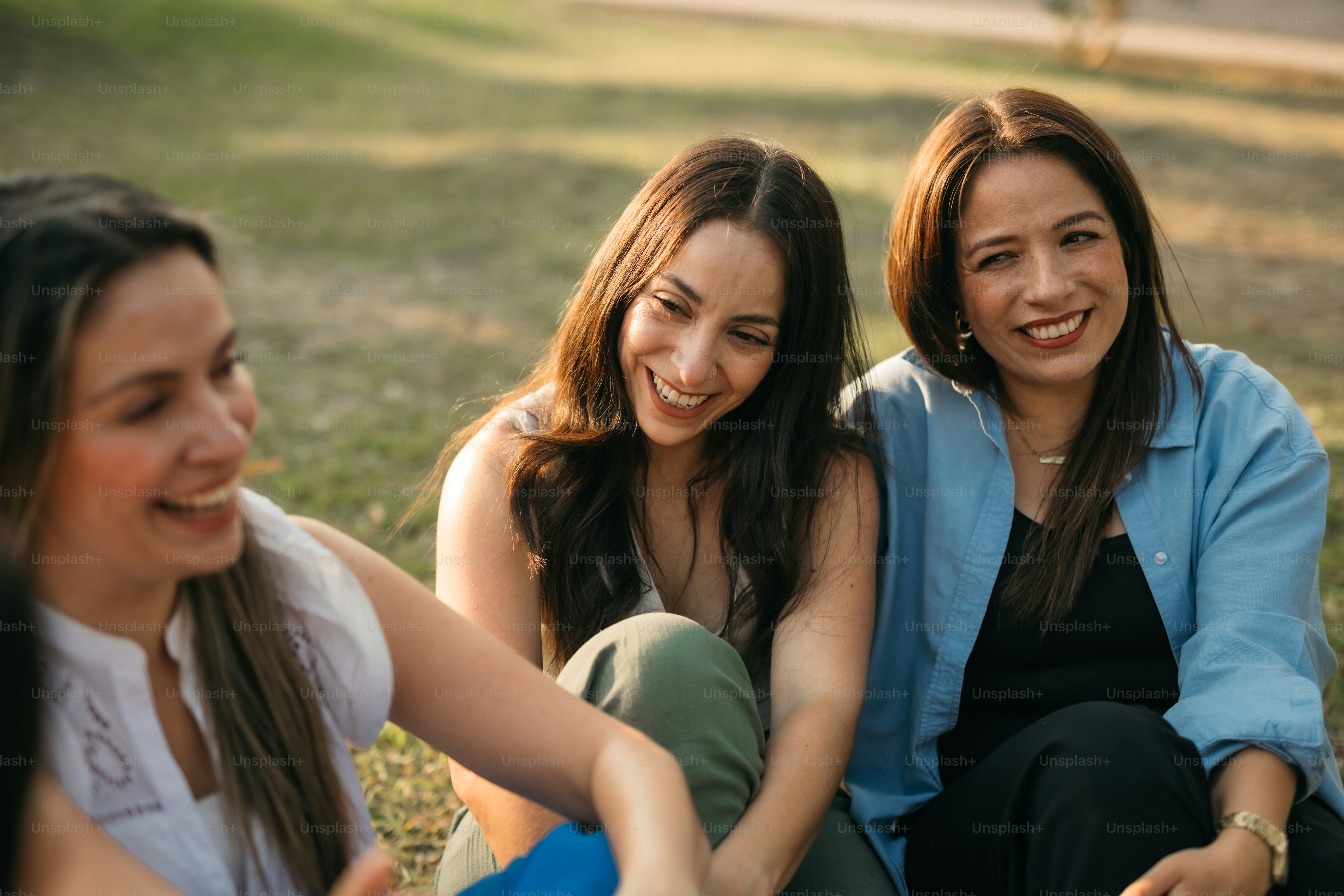 Happy women laugh together outside in the sunshine. photo – Portrait ...