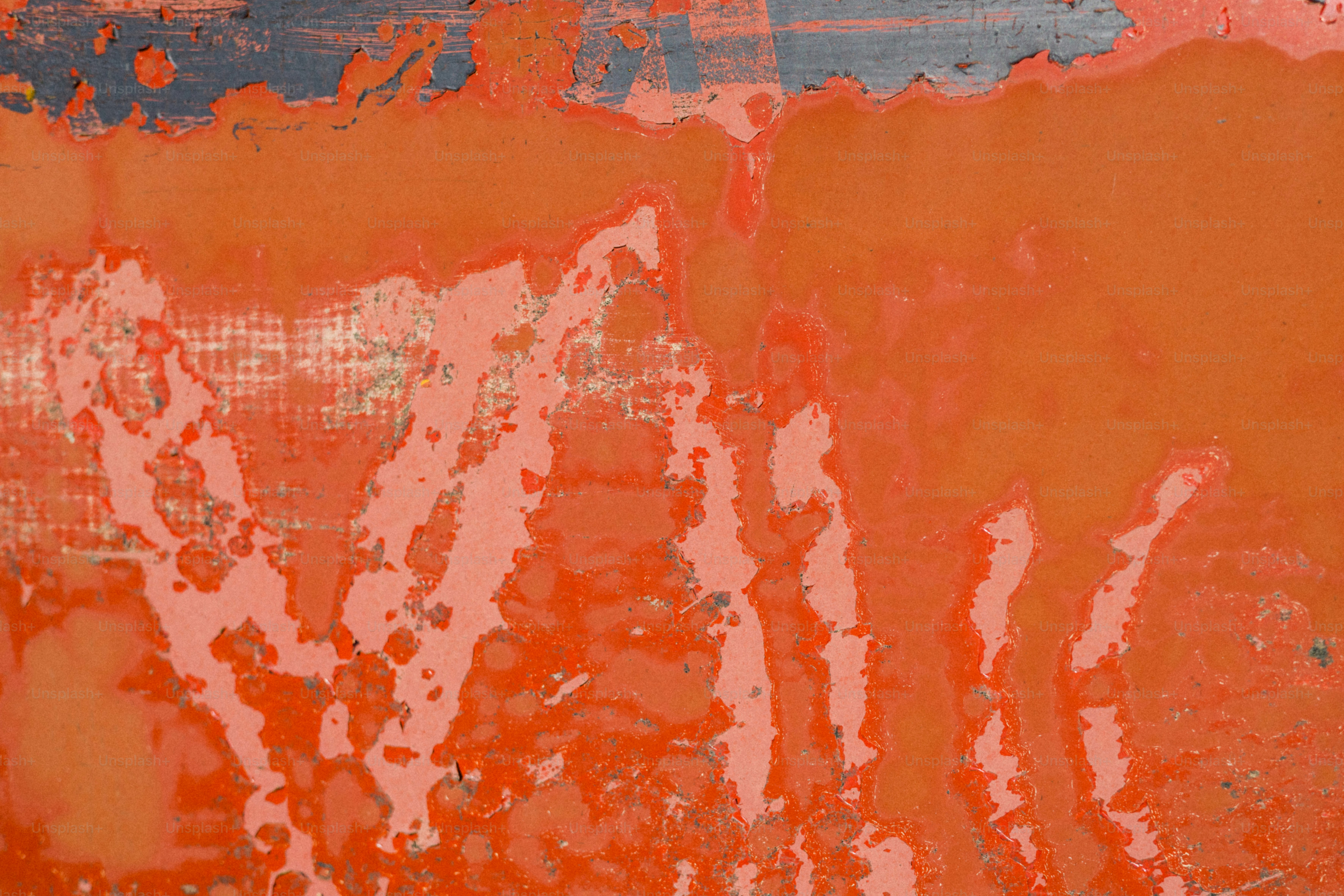 Orange paint drips across a textured surface. photo – Texture Image on ...