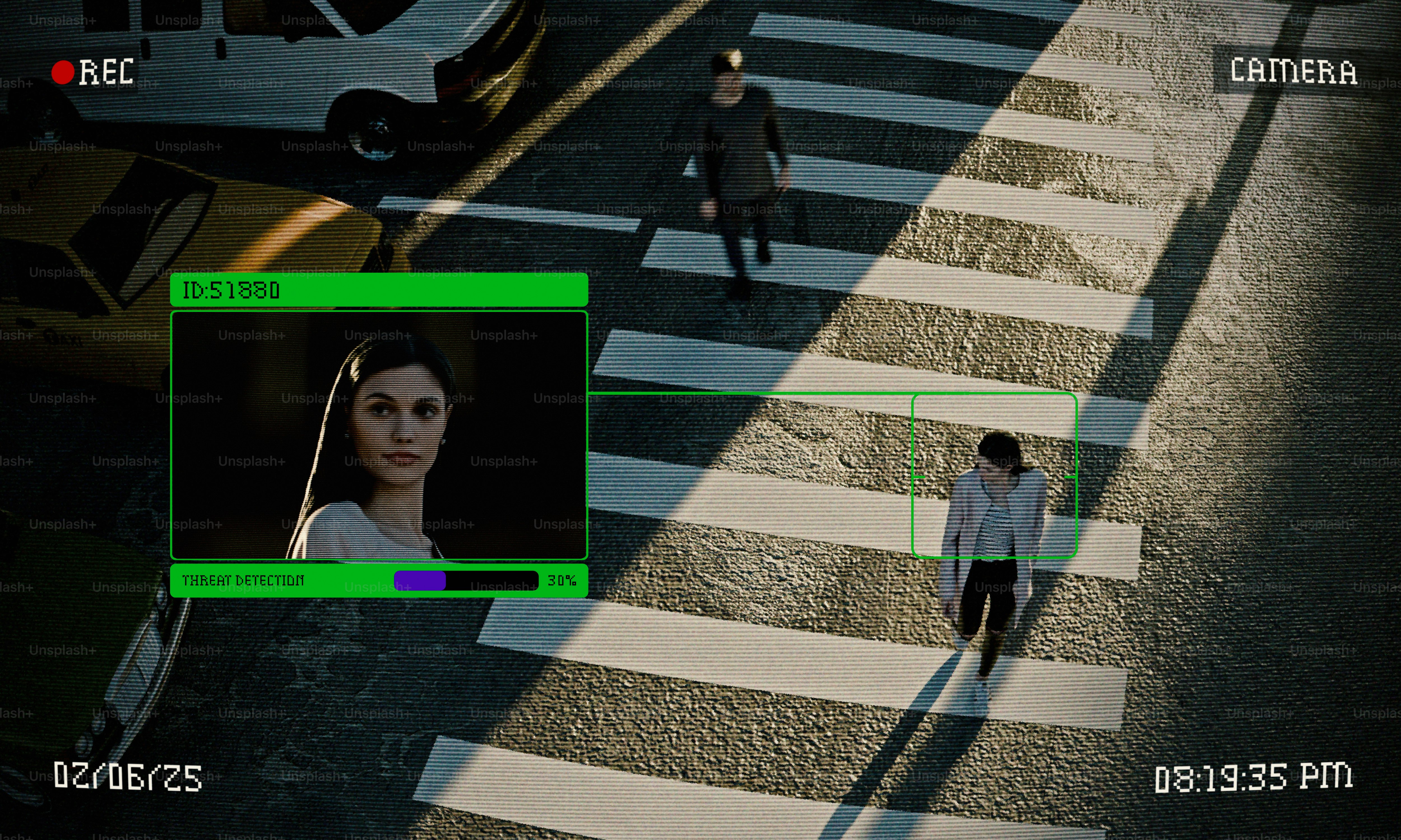 Surveillance camera footage captures people on a crosswalk. photo ...