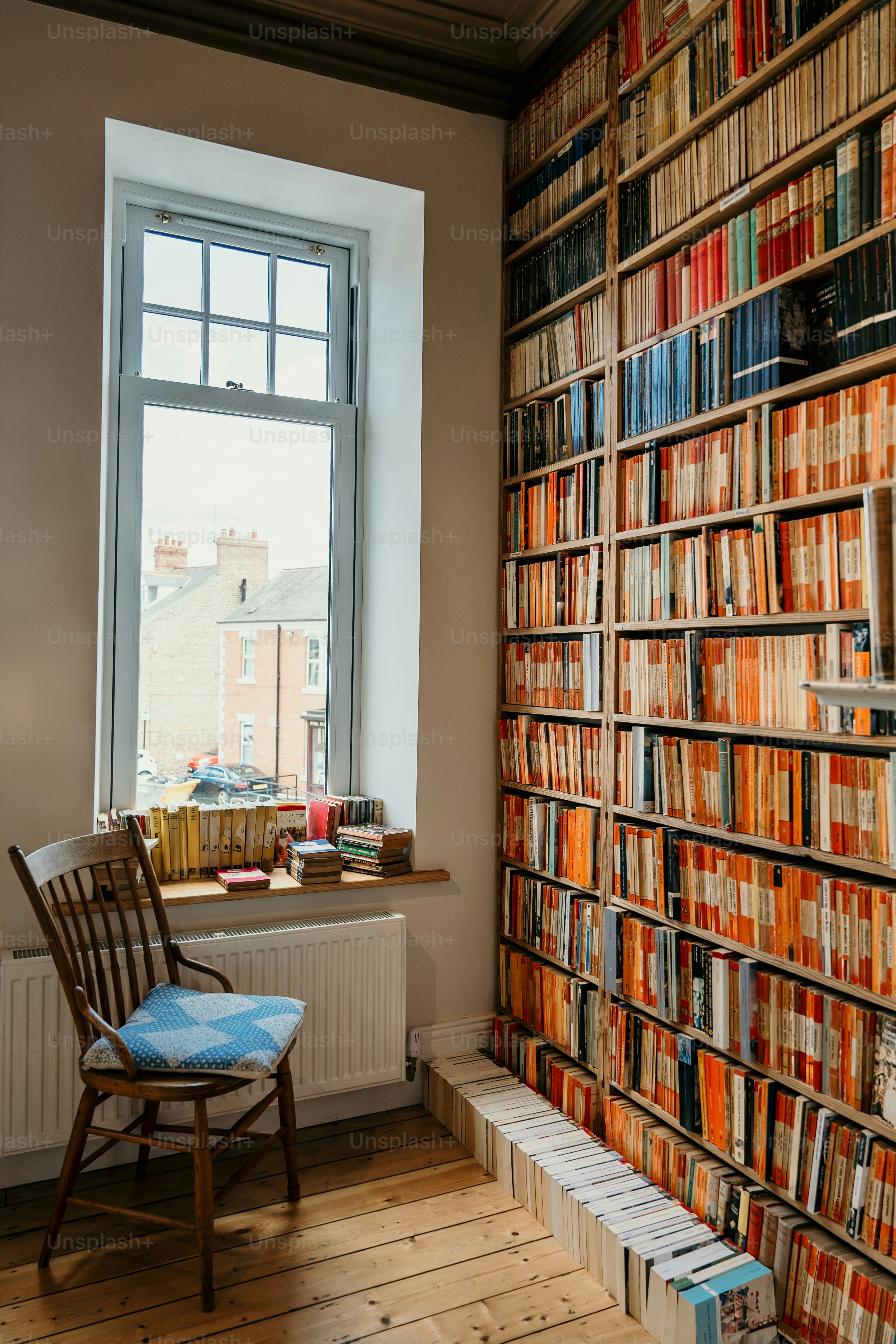 Cozy library corner with tons of books. photo – Books Image on Unsplash