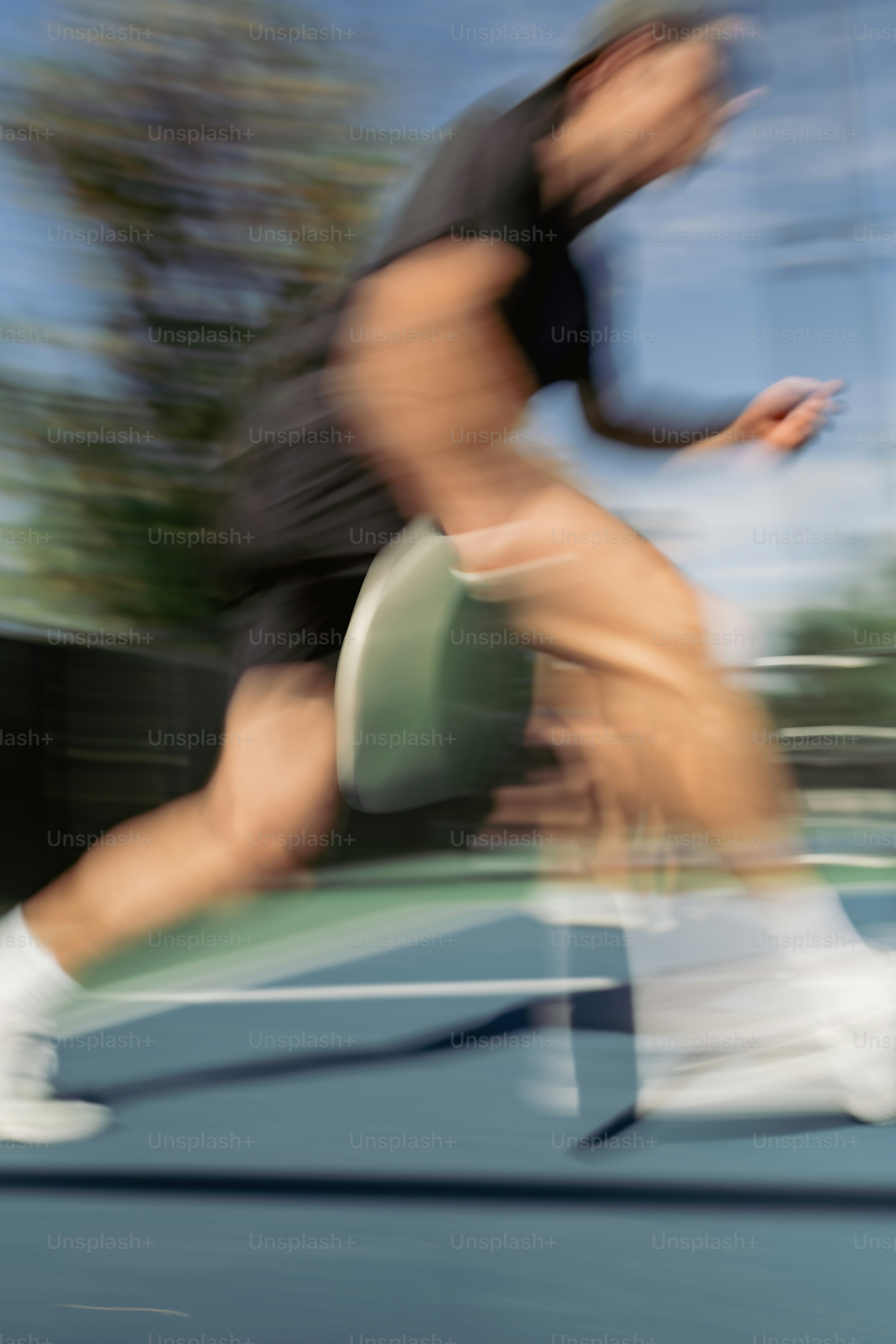 A tennis player moves fast on the court. photo – Sports Image on Unsplash