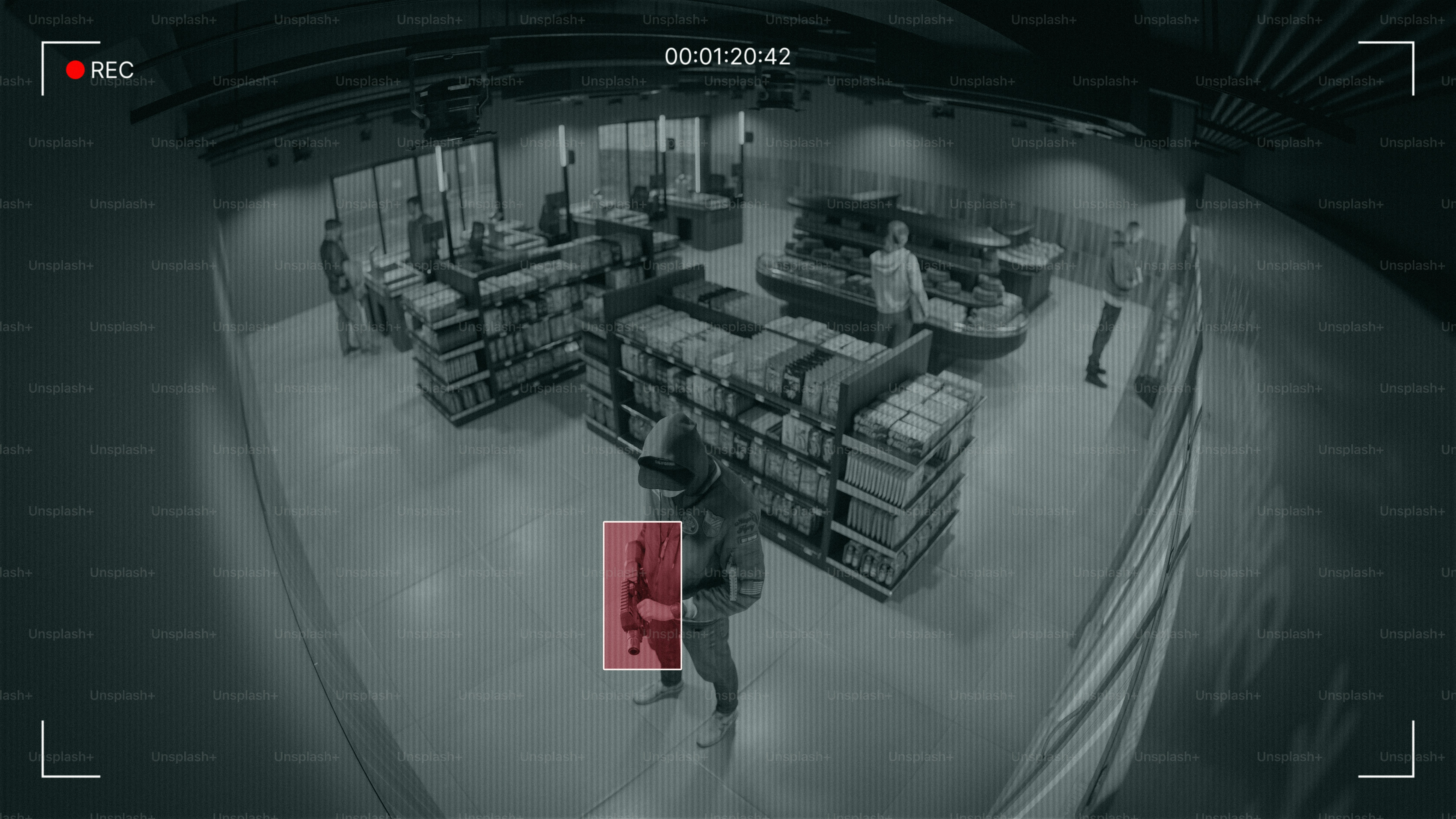 A person of interest is highlighted on security camera. photo ...