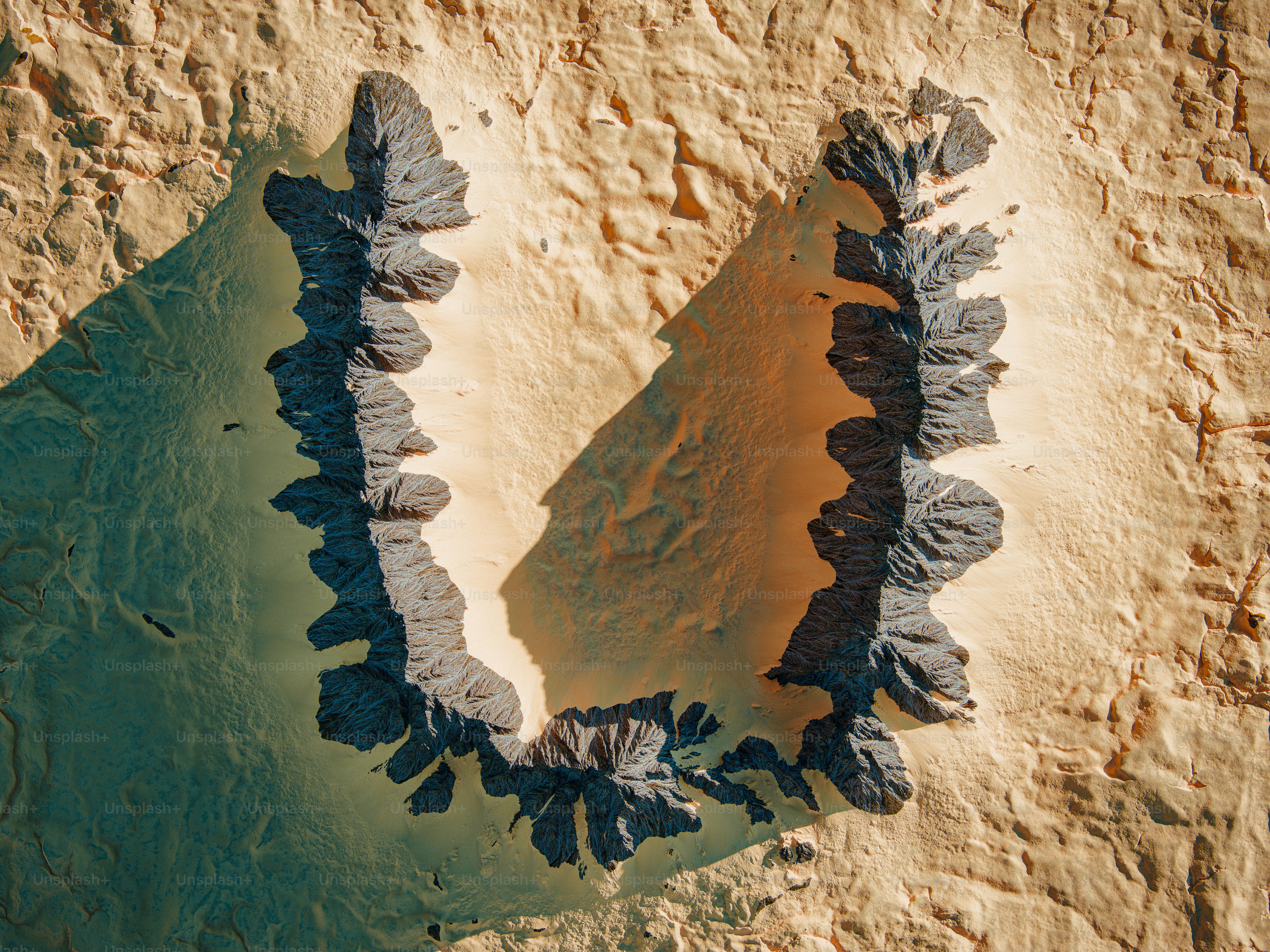 Sand formations cast dramatic shadows in the desert. photo – Wallpaper ...