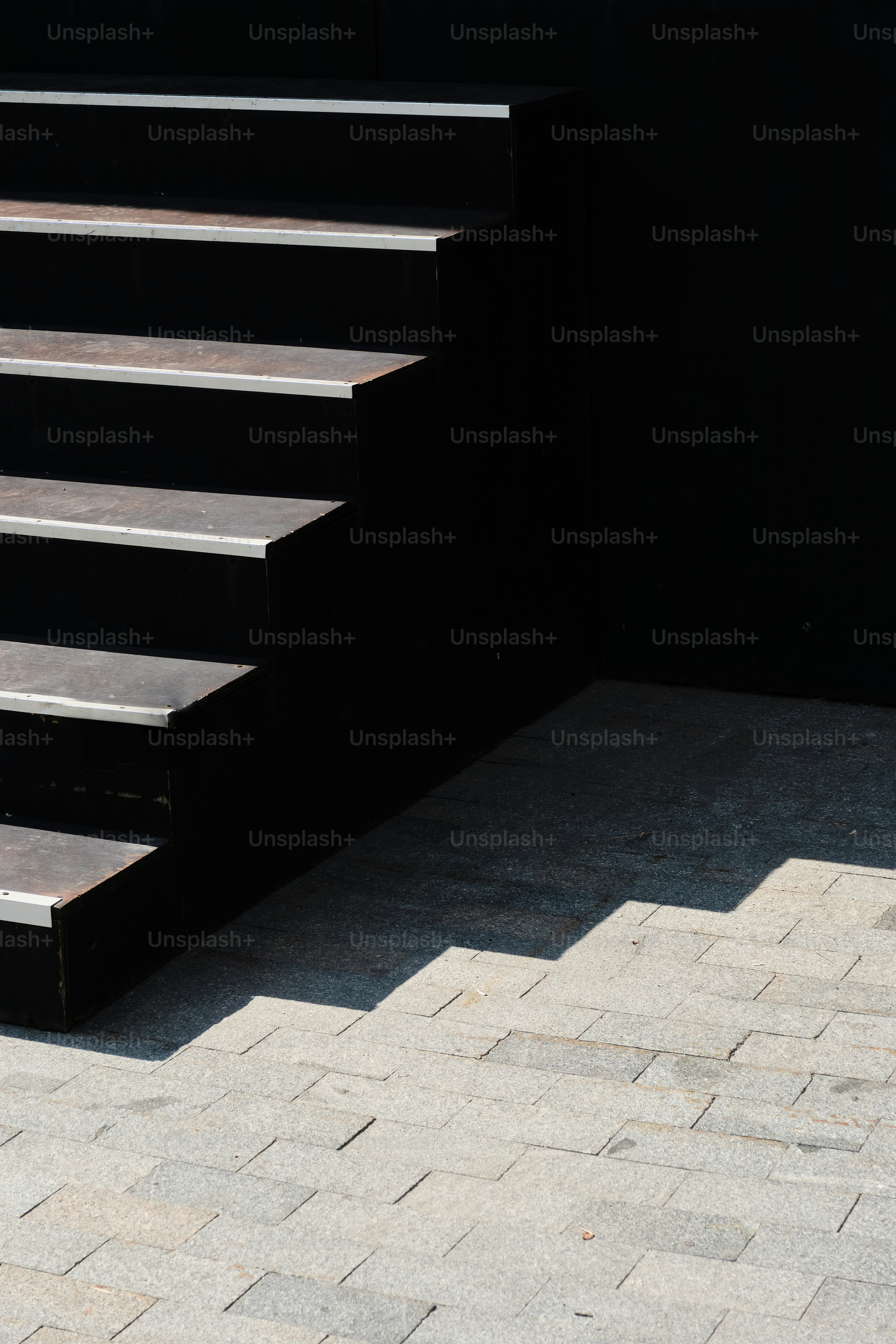 Stairs cast a shadow on the stone floor. photo – Background Image on ...