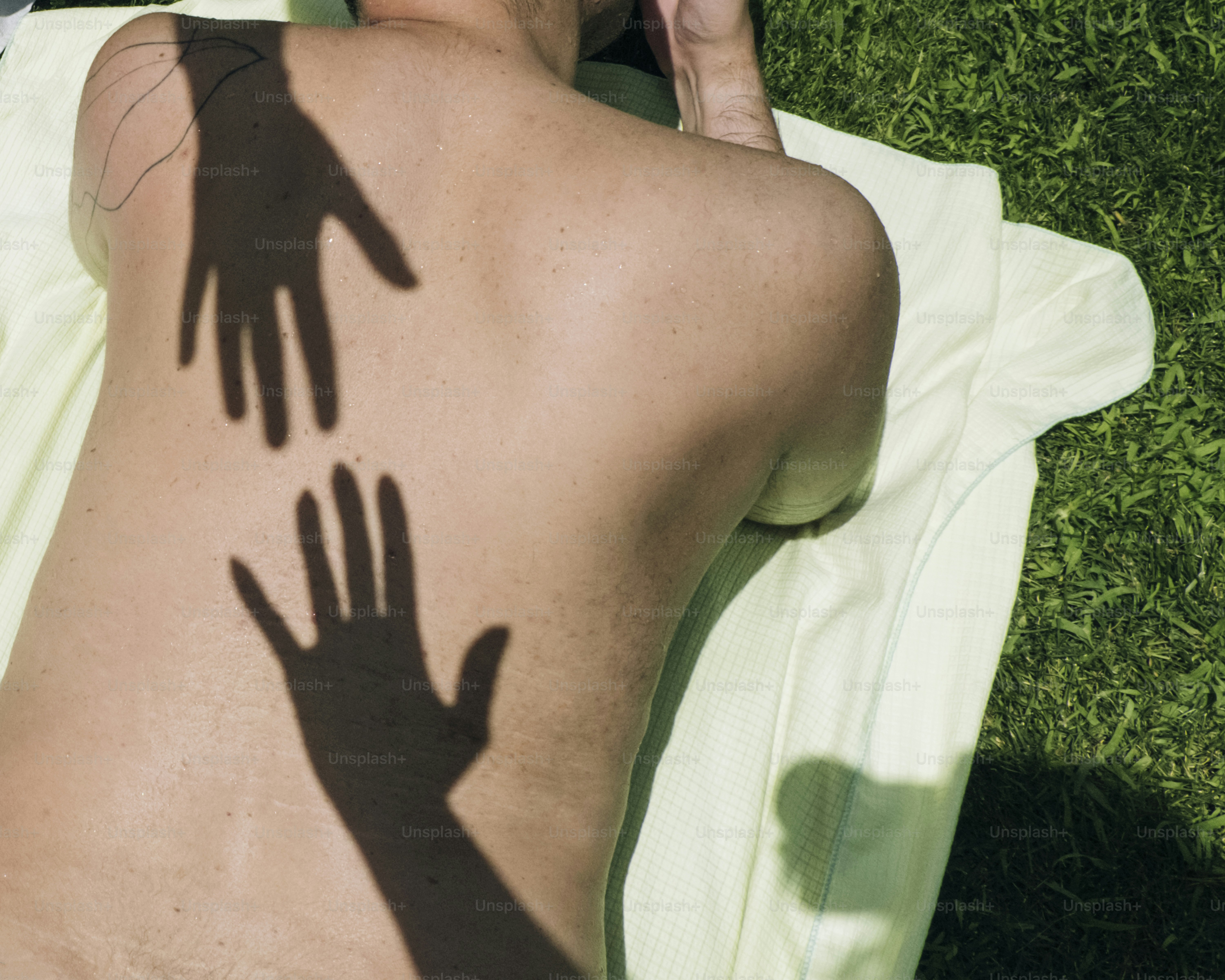 A shadow shows hands forming a heart. photo – Abstract Image on Unsplash