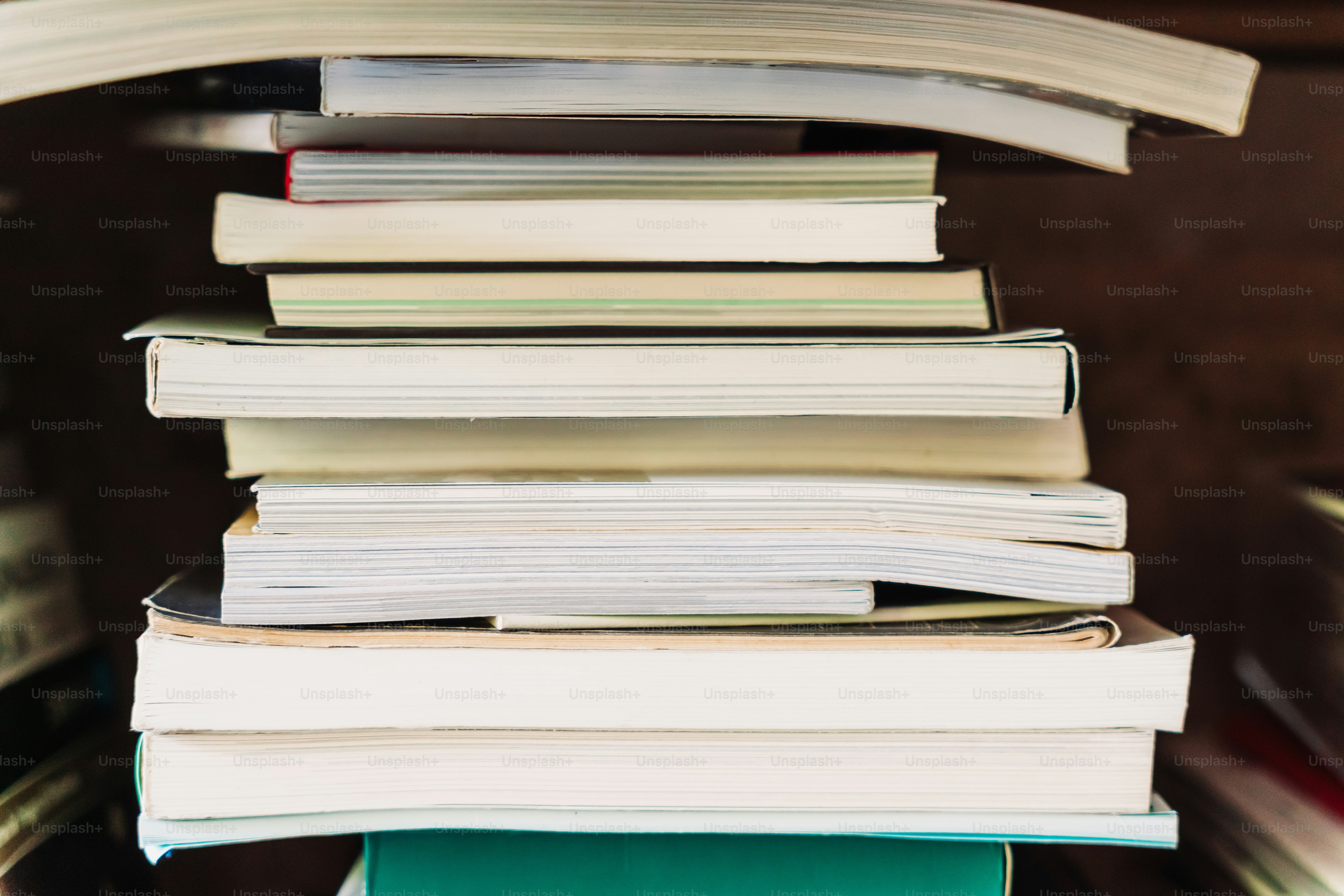 Books neatly arranged on a shelf. photo – Books Image on Unsplash