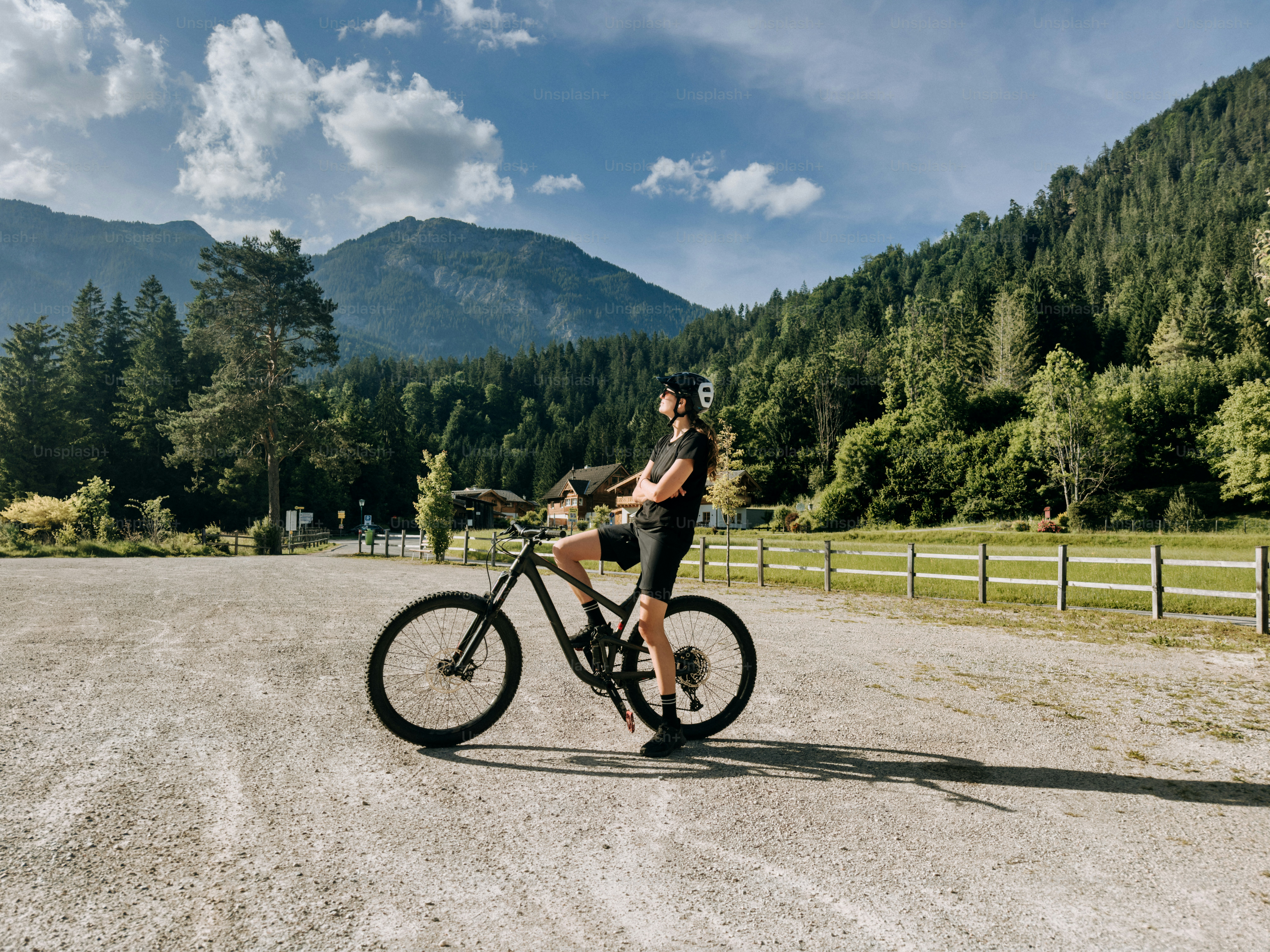 A person is riding a bicycle in nature. photo – Travel Image on Unsplash