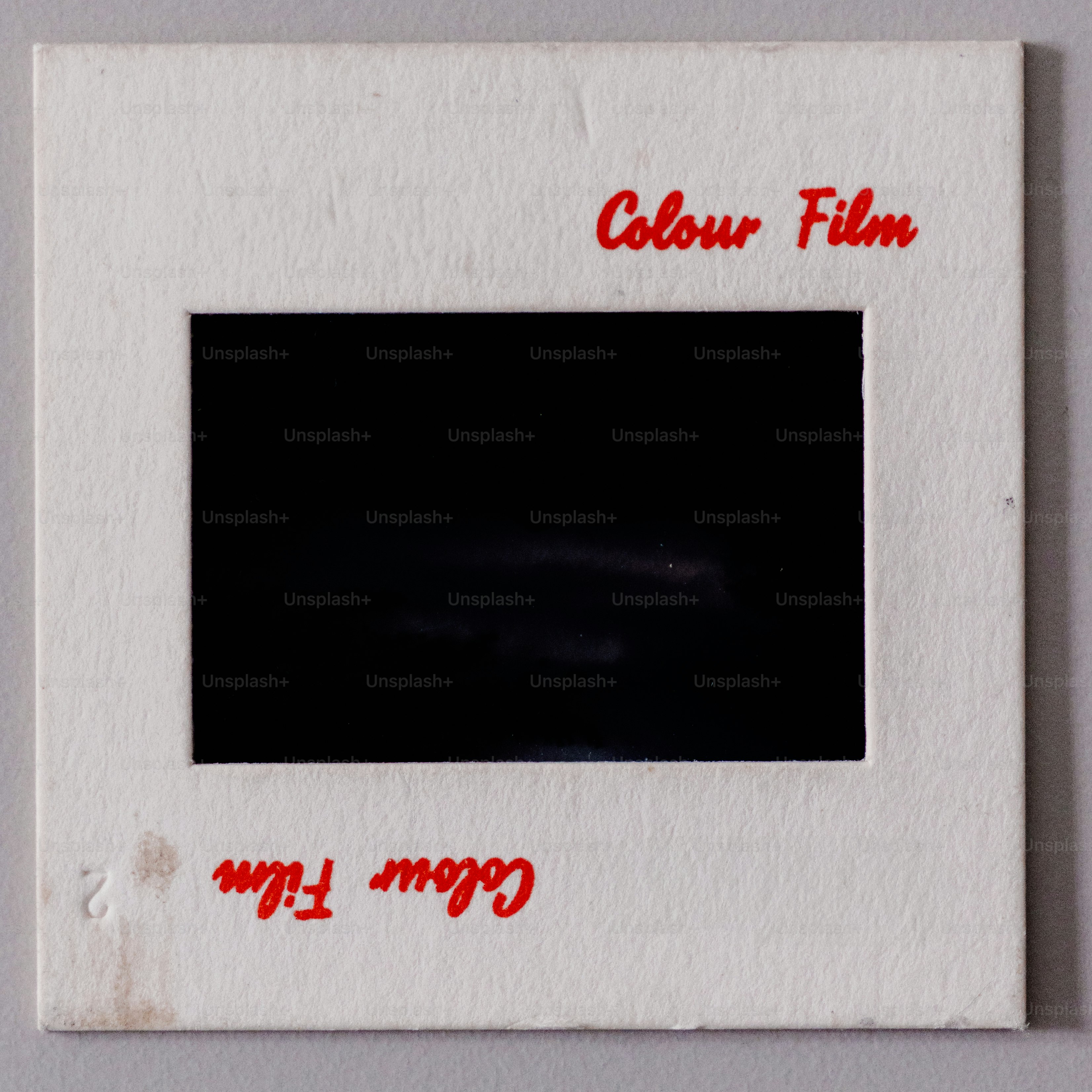 A blank slide labeled "colour film." photo – Film photography Image on ...
