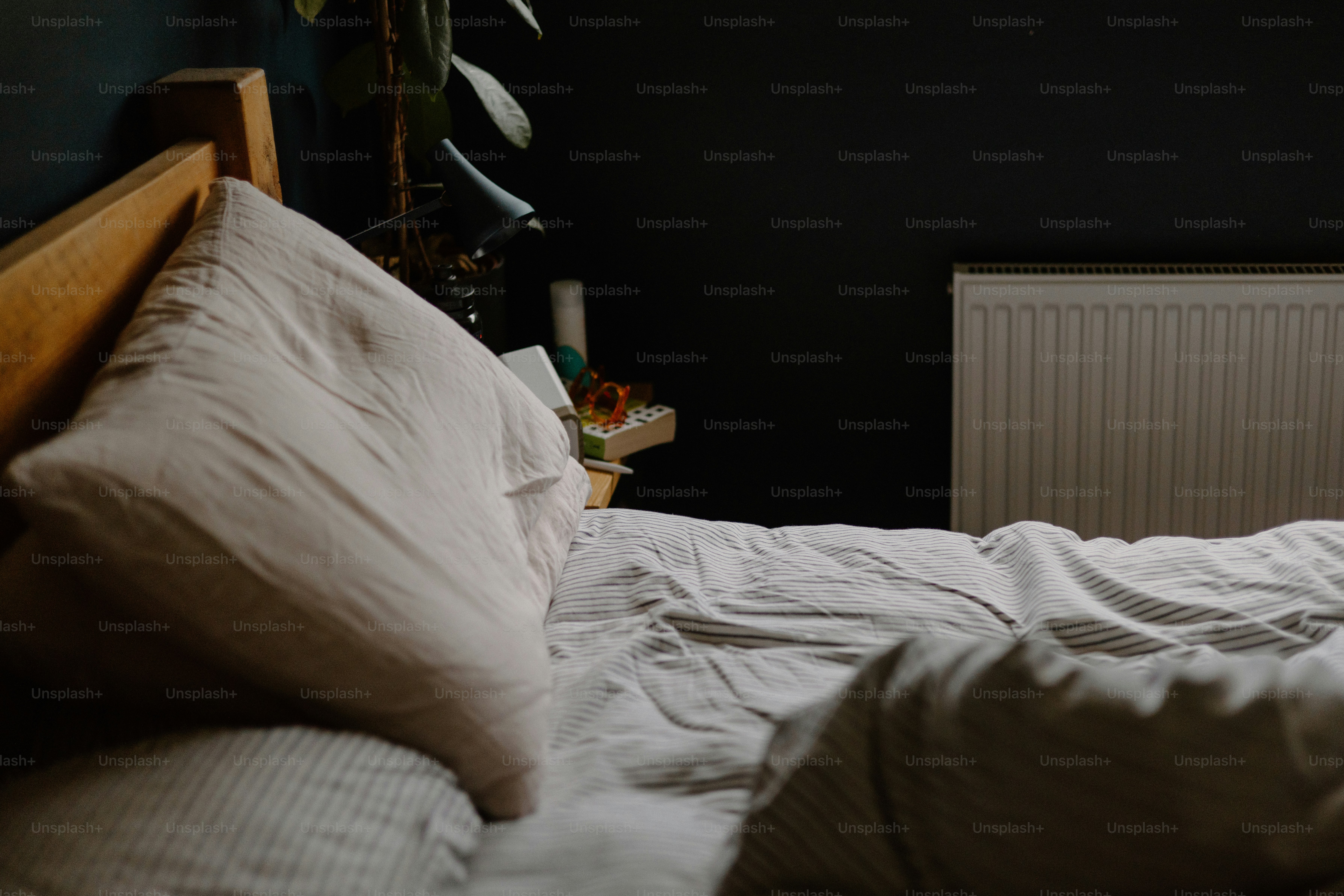 Unmade bed with pillows and rumpled sheets. photo – Bedroom Image on ...