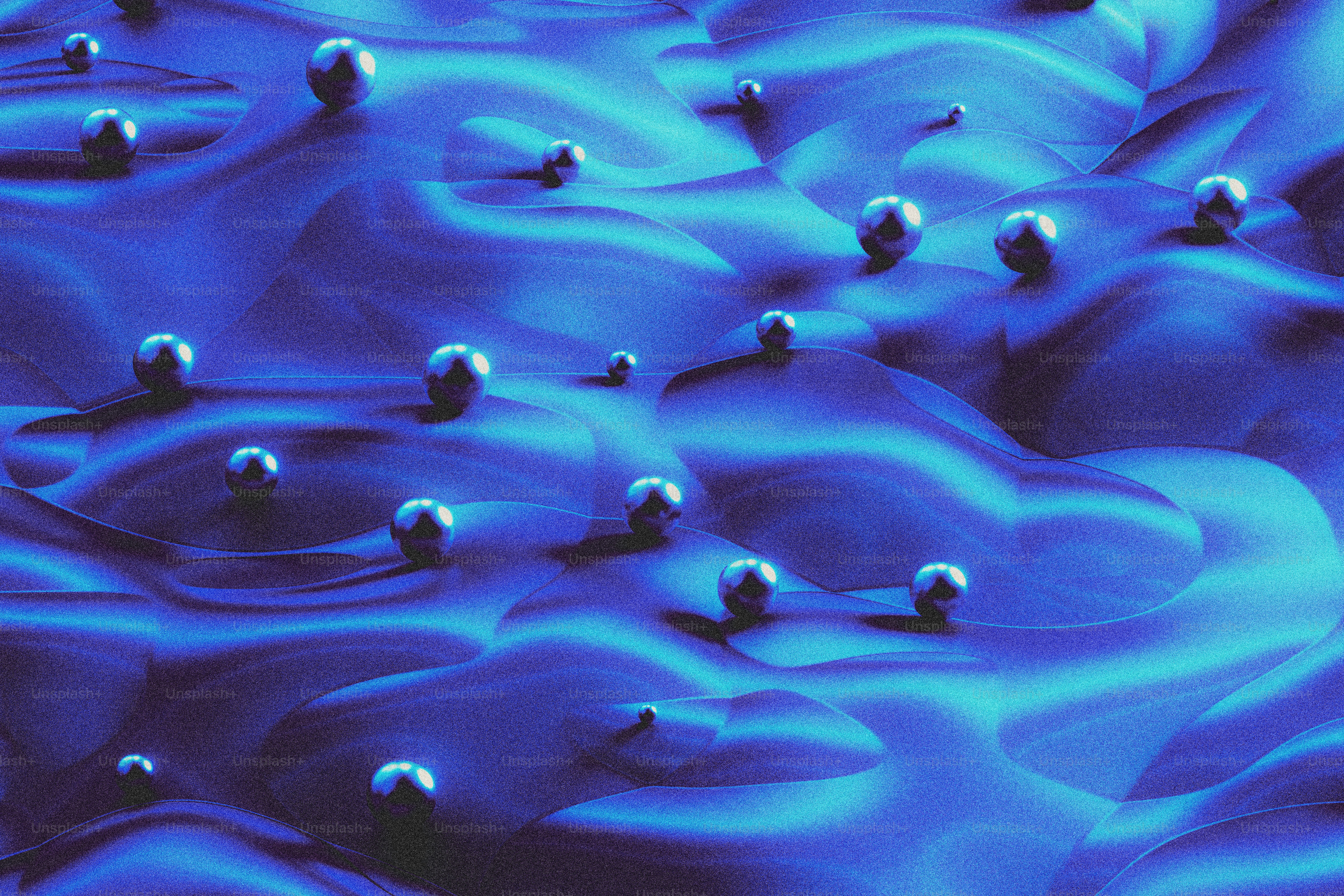 Shiny spheres rest on a glowing, blue surface. photo – Wallpaper Image ...