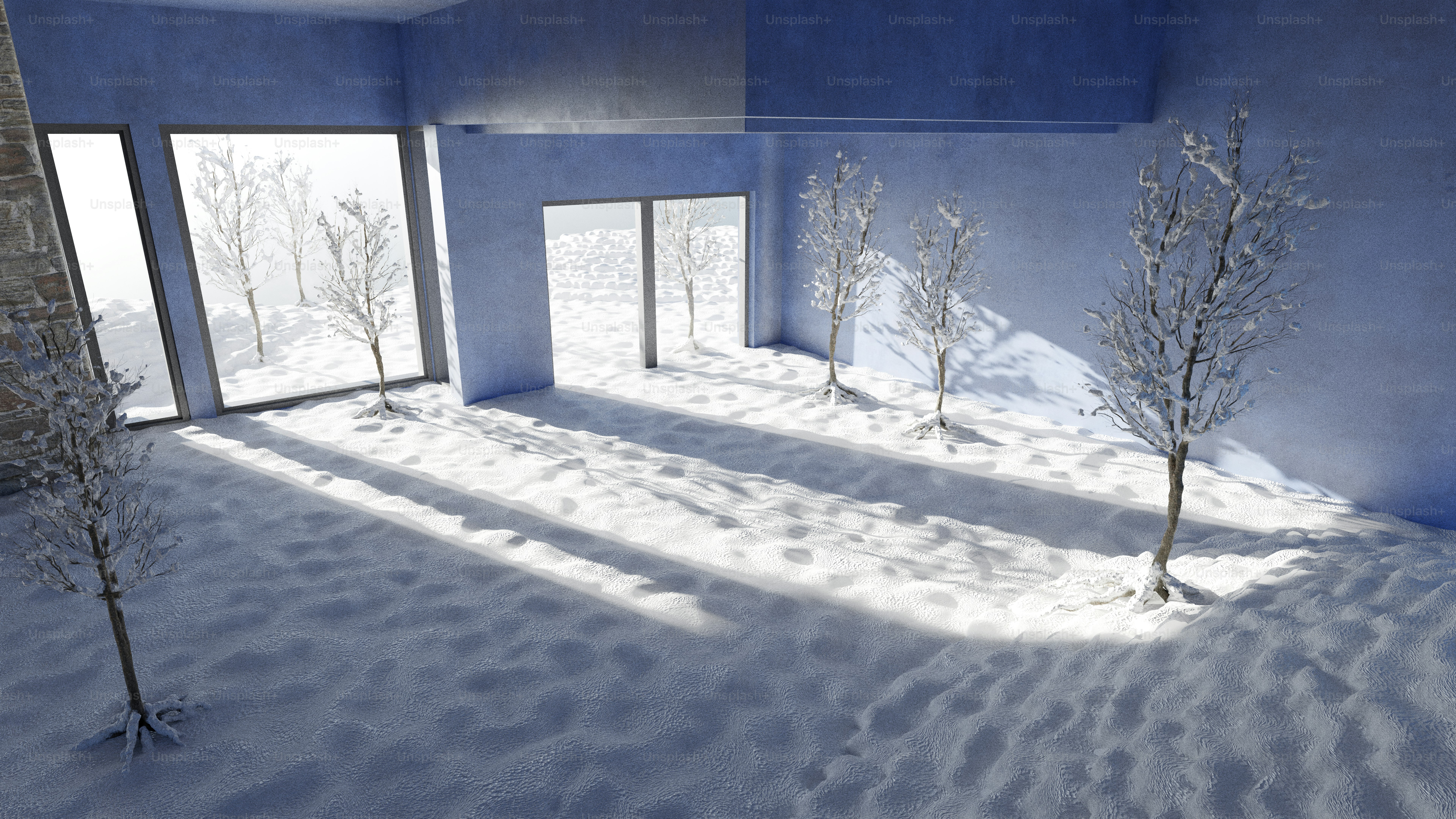 A snowy winter scene inside a building. photo – Indoor Image on Unsplash