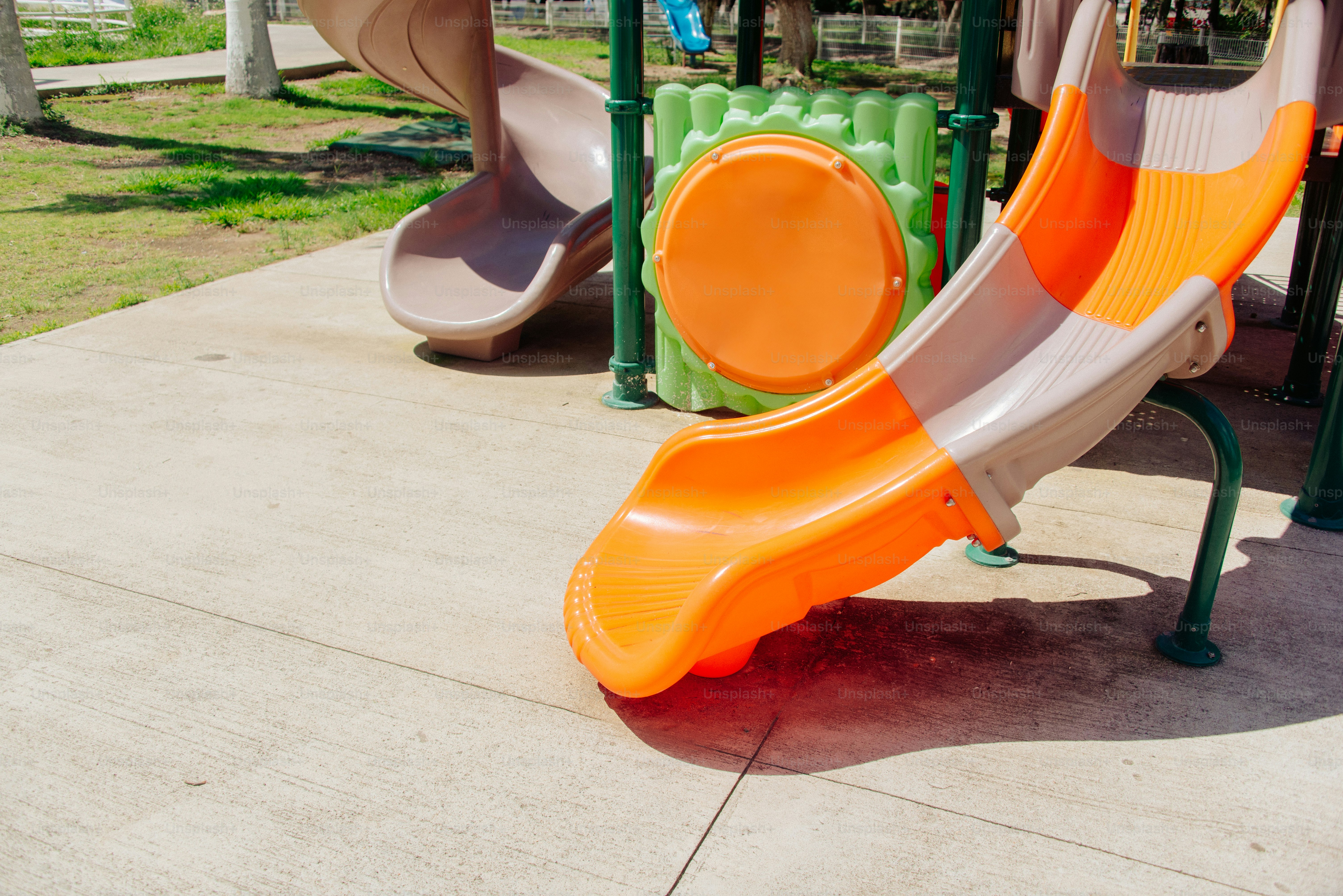 Colorful playground equipment is ready for play. photo – Blue Image on ...