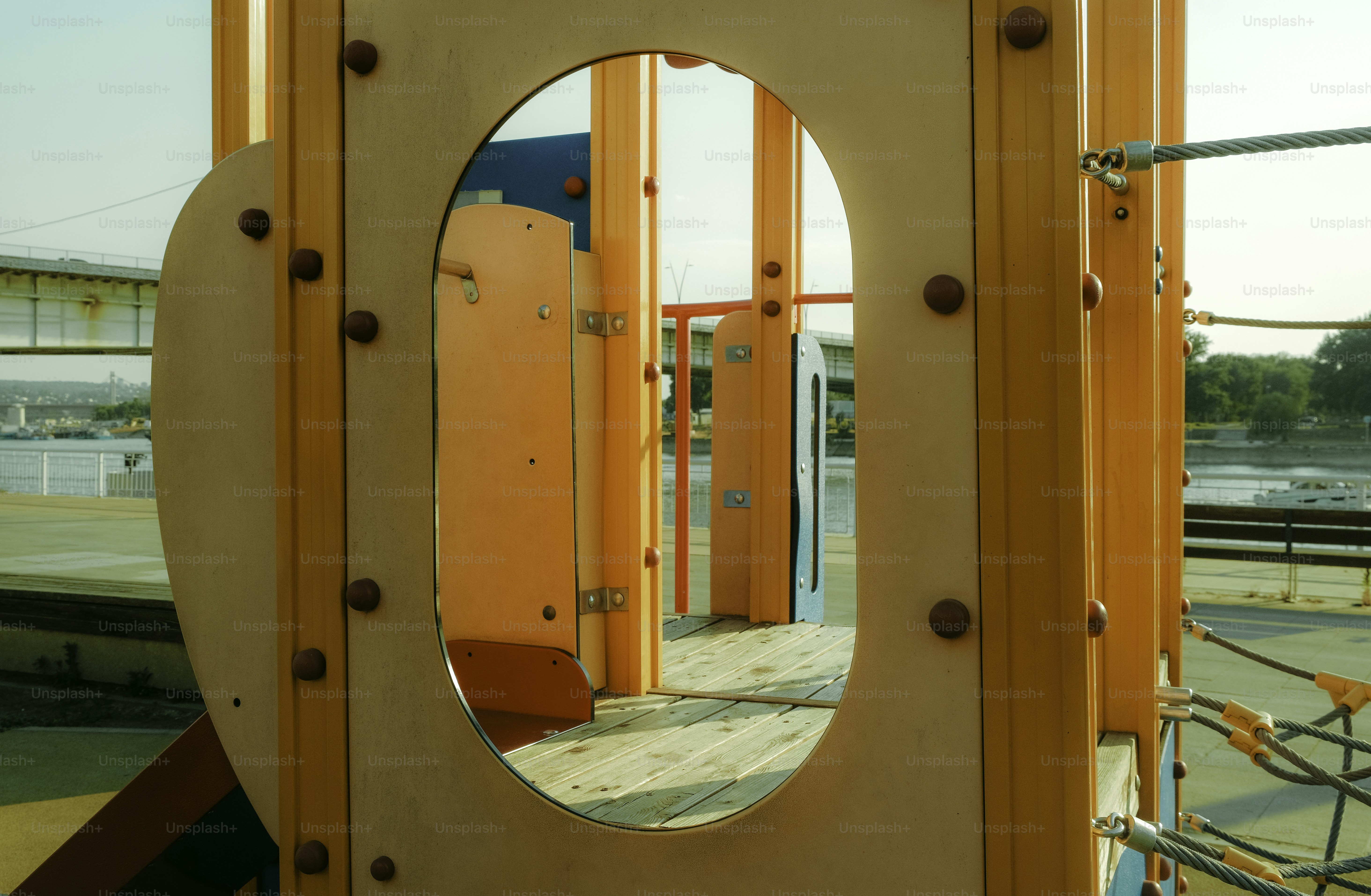 Playground equipment with an oval opening. photo – Joy Image on Unsplash