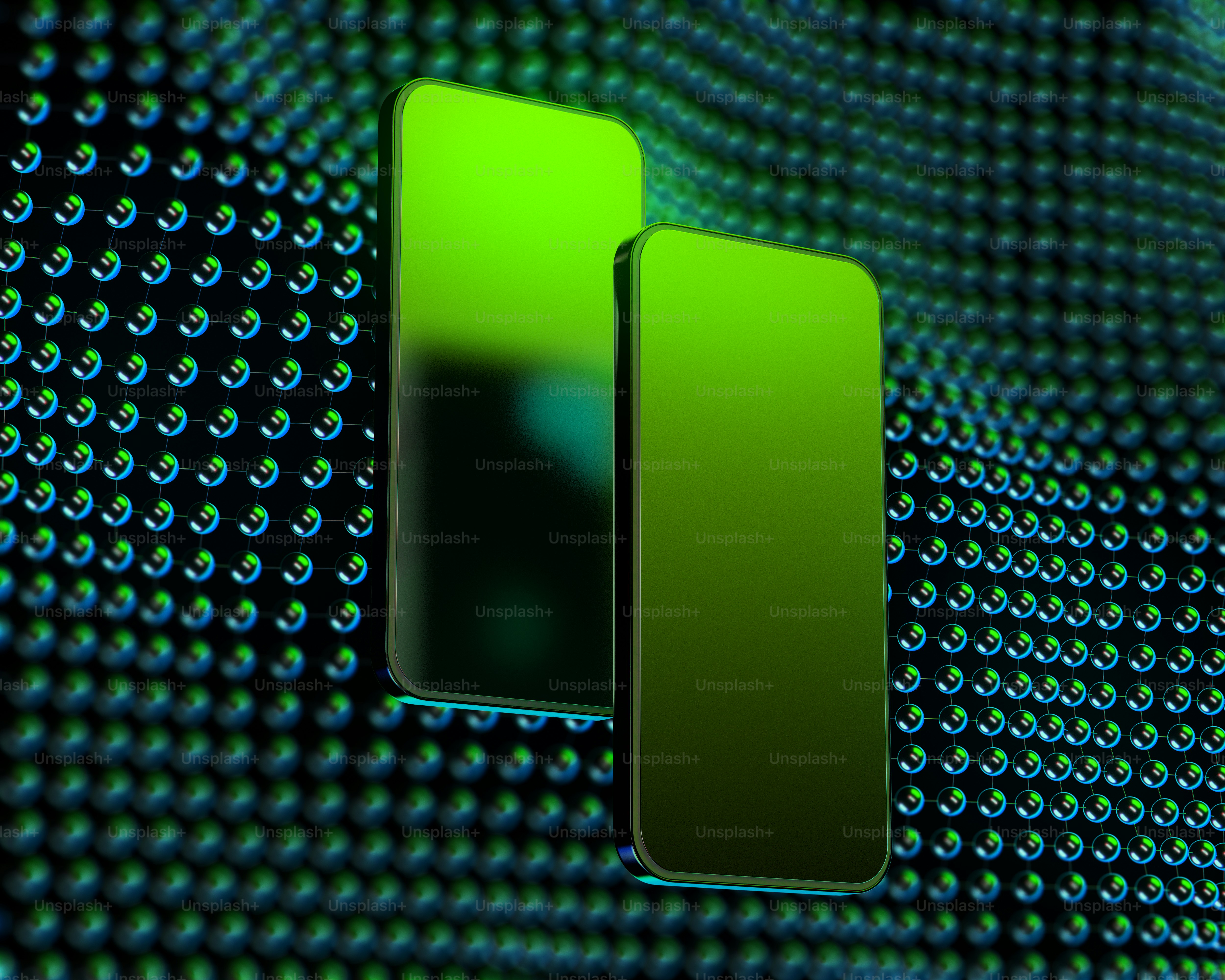 Two green phones on a textured, dark background. photo – Product Image ...