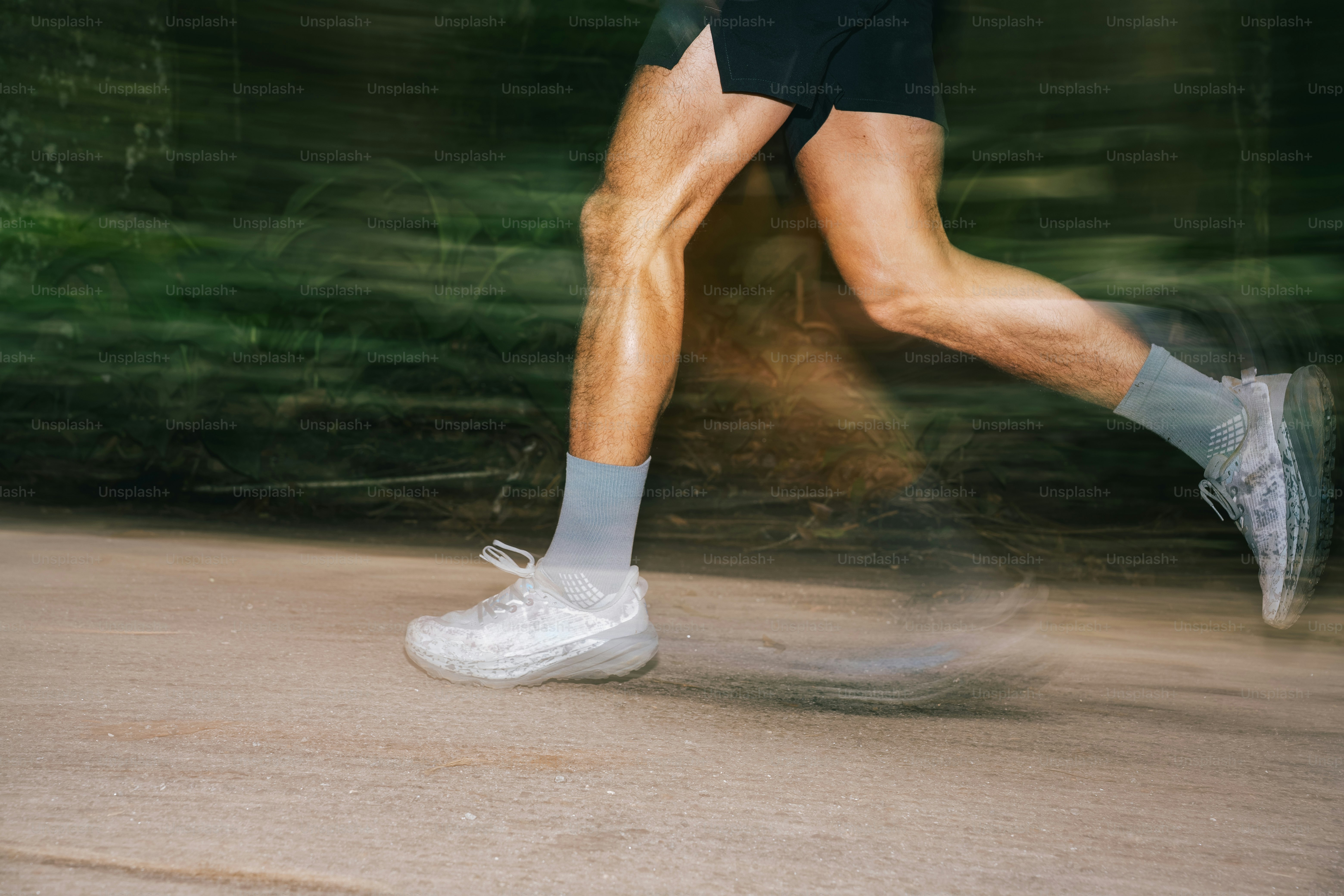 Runner's legs in motion with blurred background. photo – Sport Image on ...