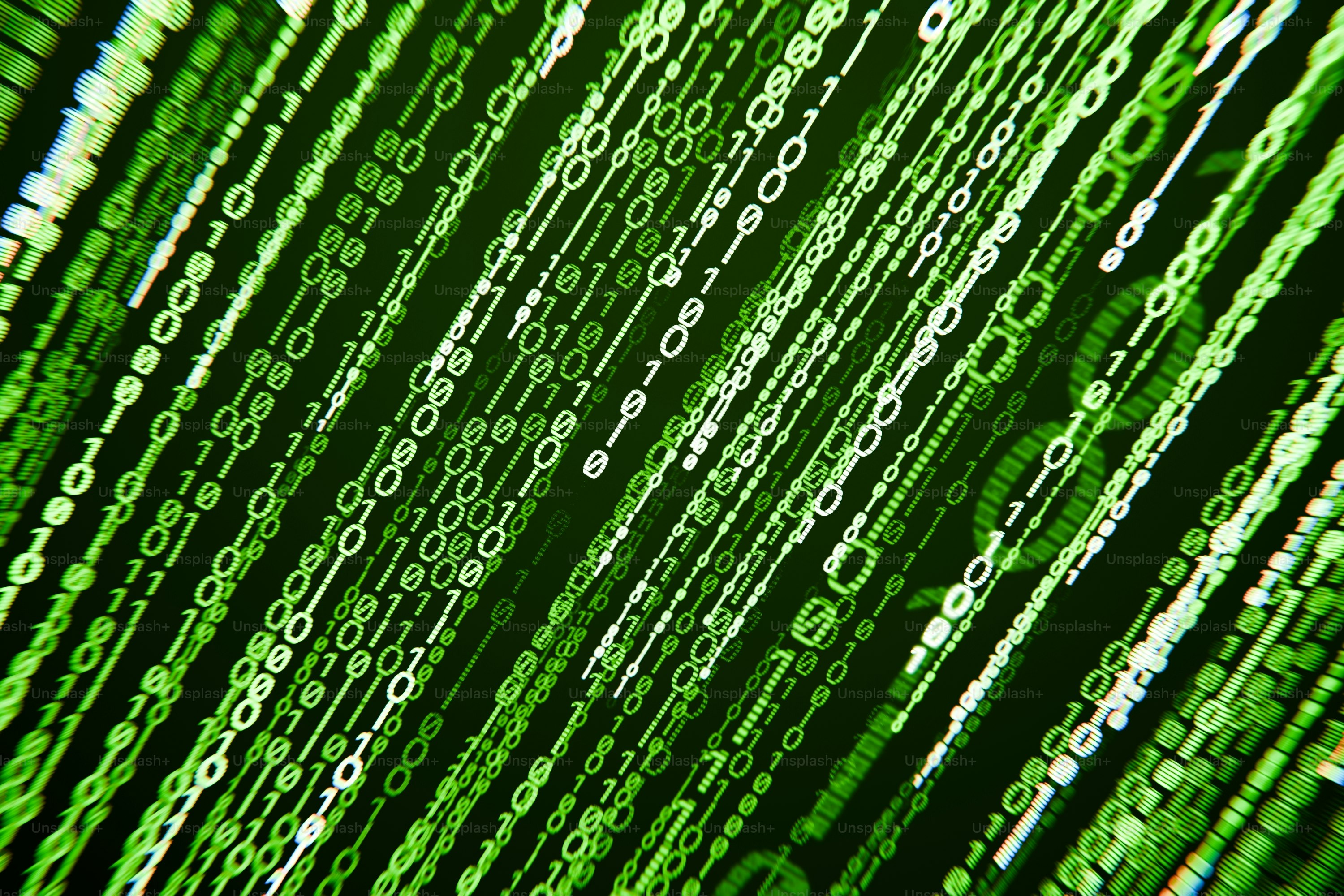 Green binary code streams across a dark background. photo – Technology ...