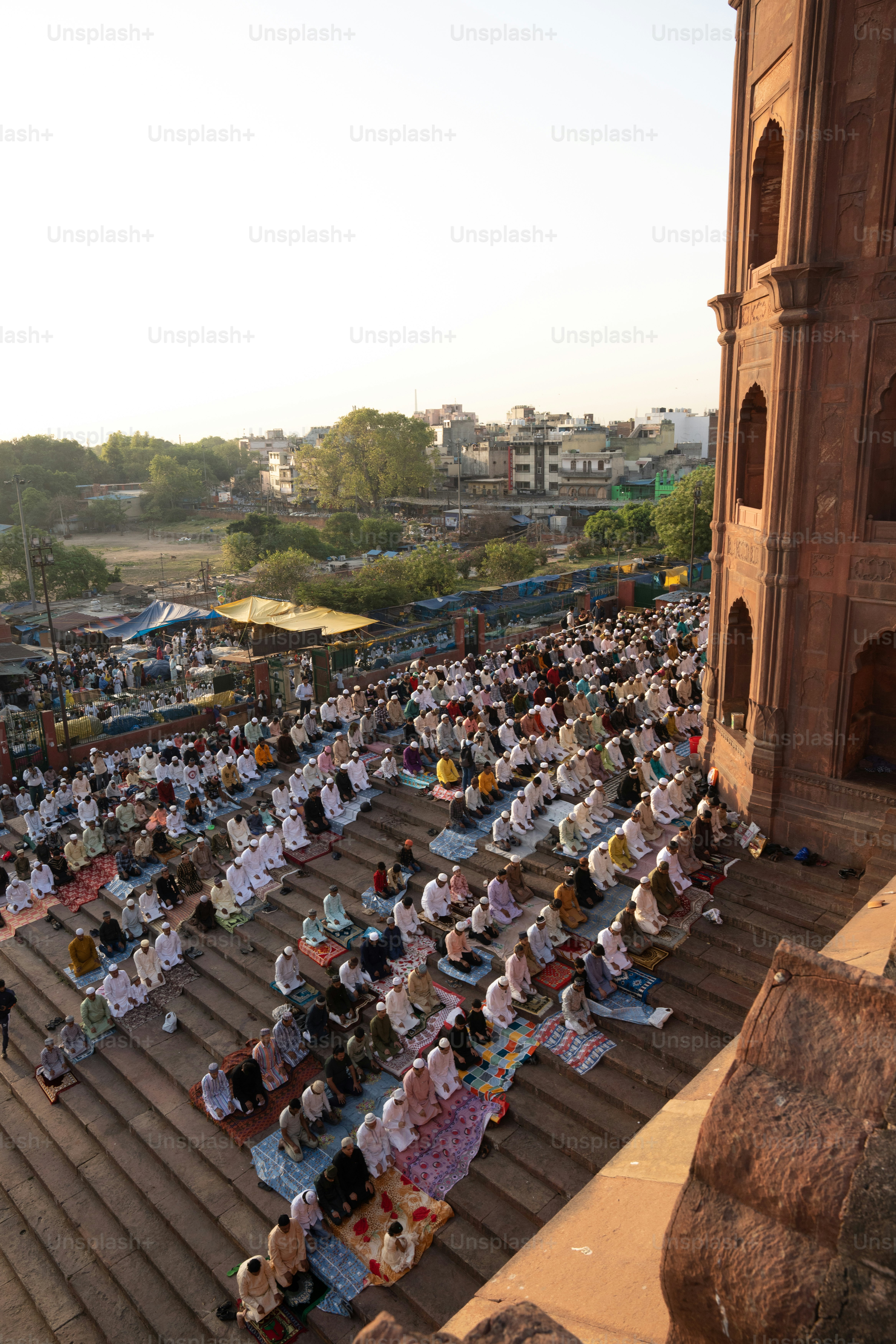 Muslims pray together in an outdoor religious ceremony. photo – Mosque ...