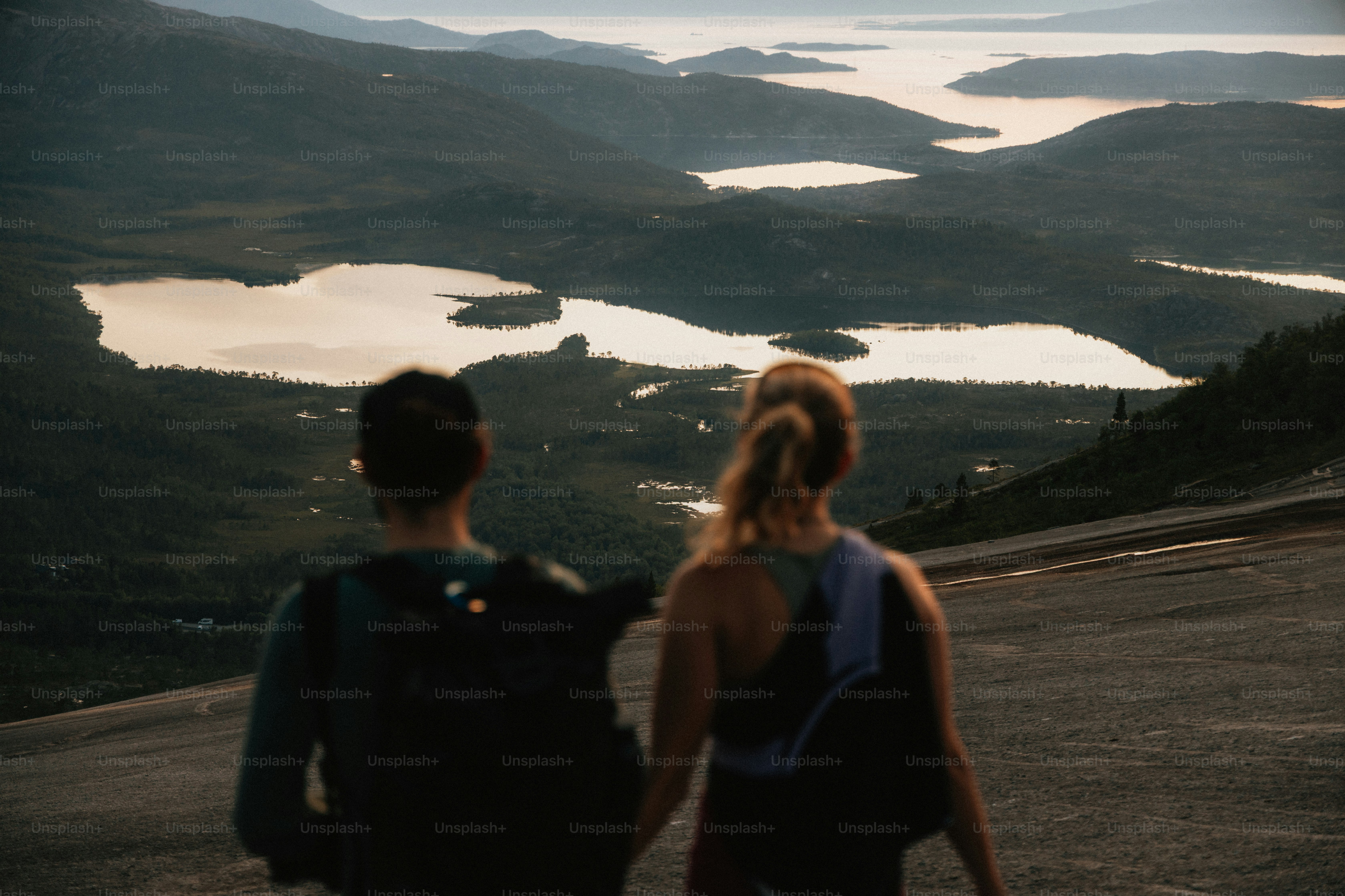Couple views beautiful landscape and lakes. photo – Travel Image on ...