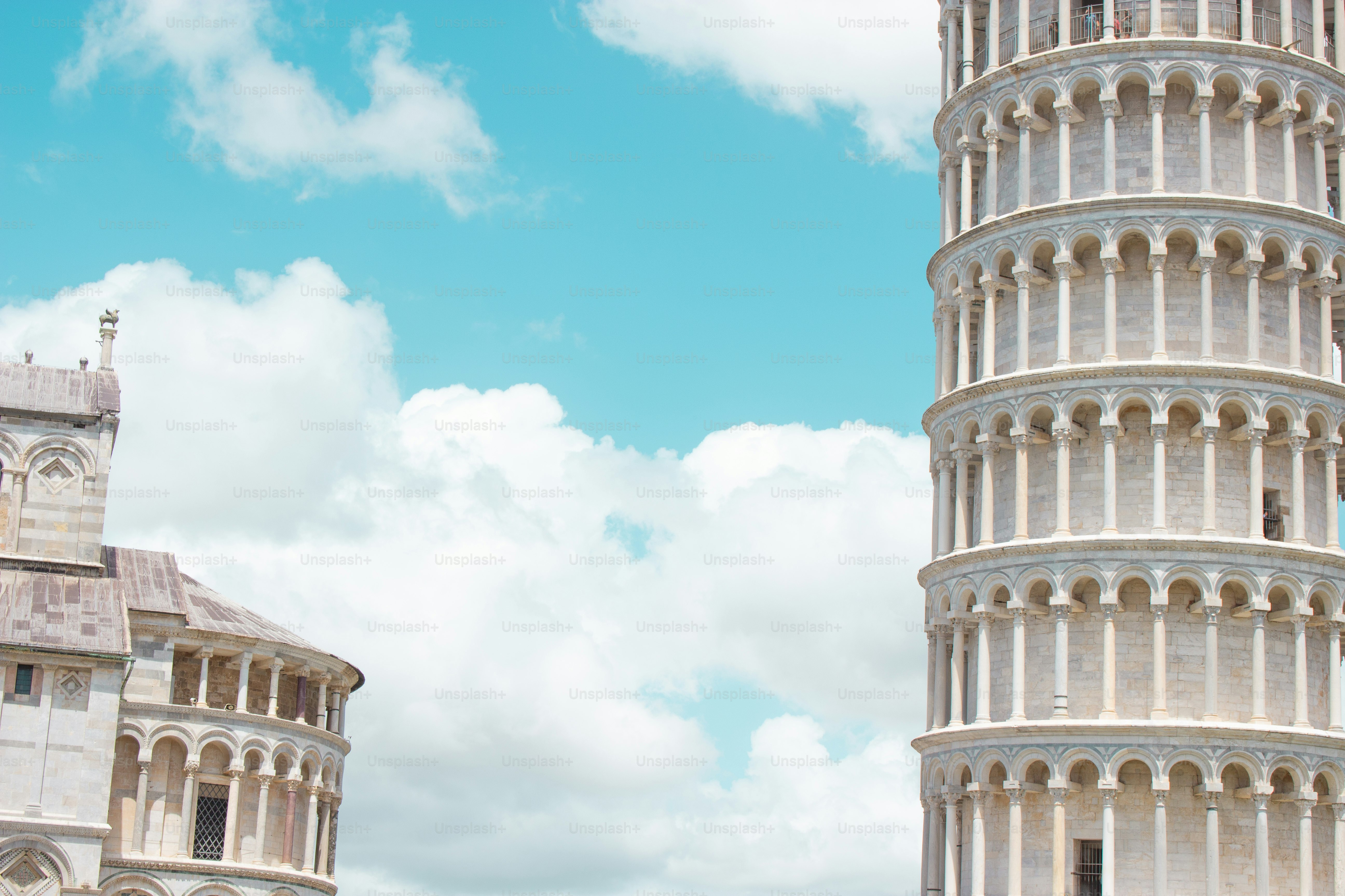 The leaning tower of pisa stands tall and proud. photo – City Image on ...