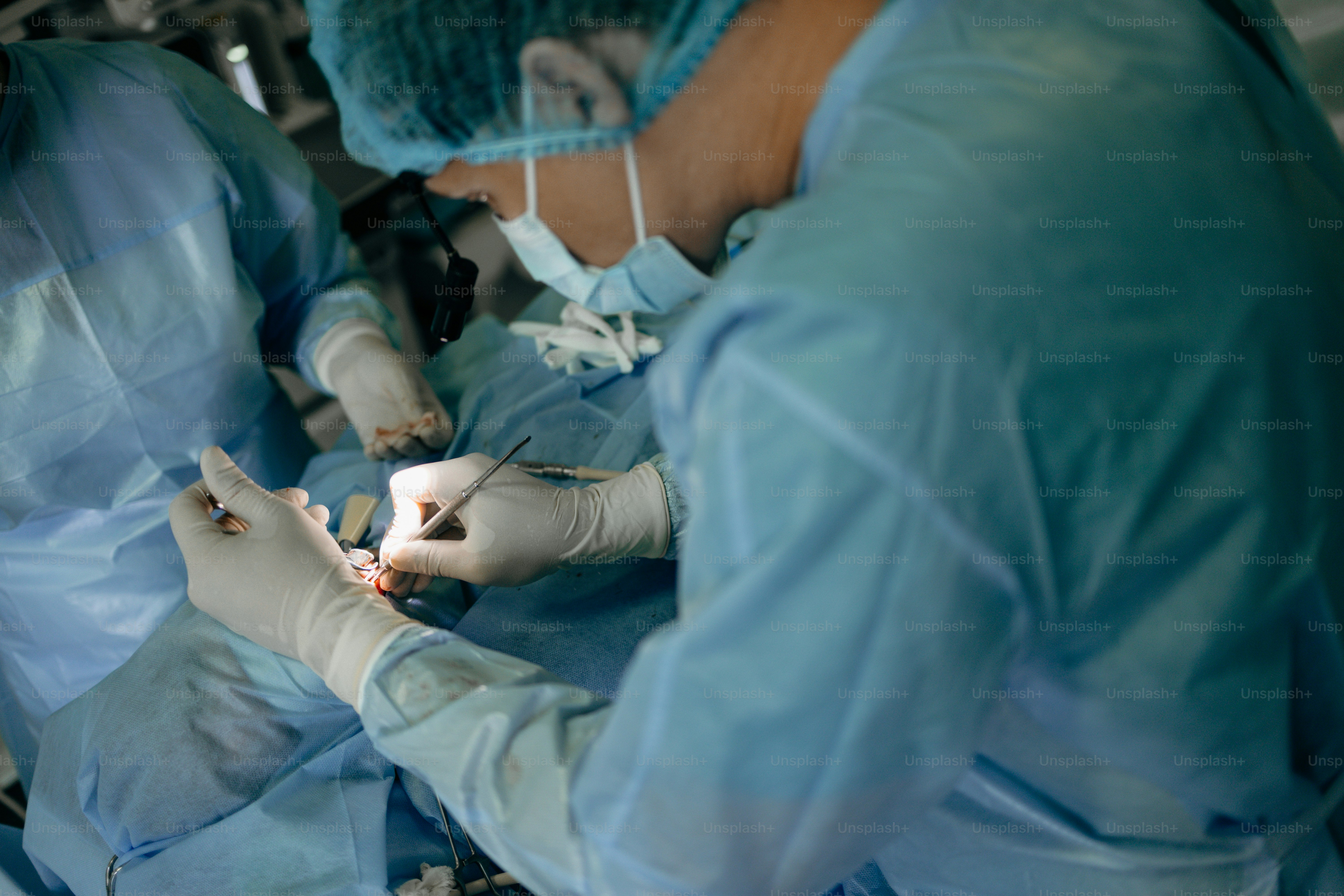 Surgeons are performing an operation on a patient. photo – Doctor Image ...