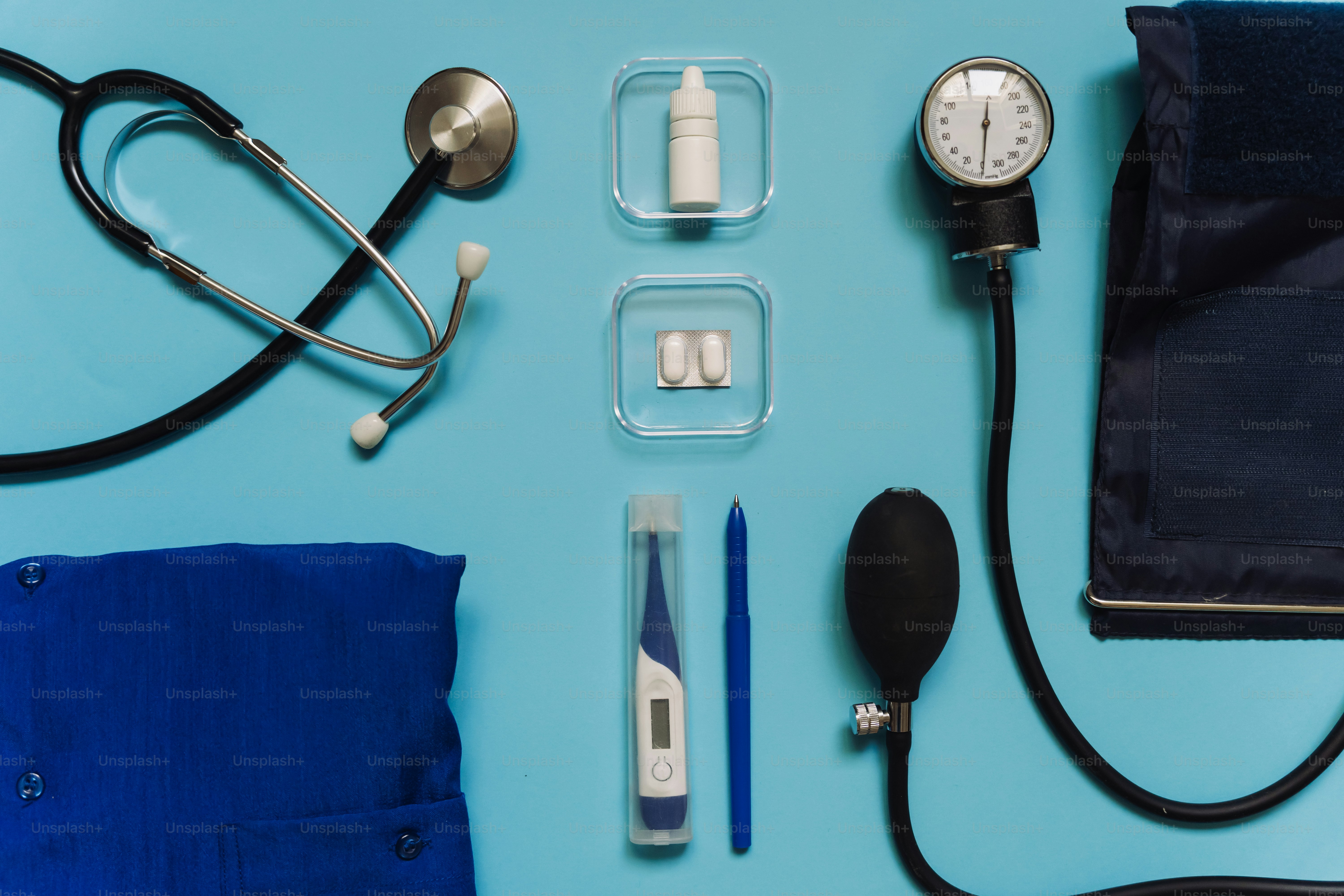 Medical tools and supplies are arranged on a blue background. photo ...