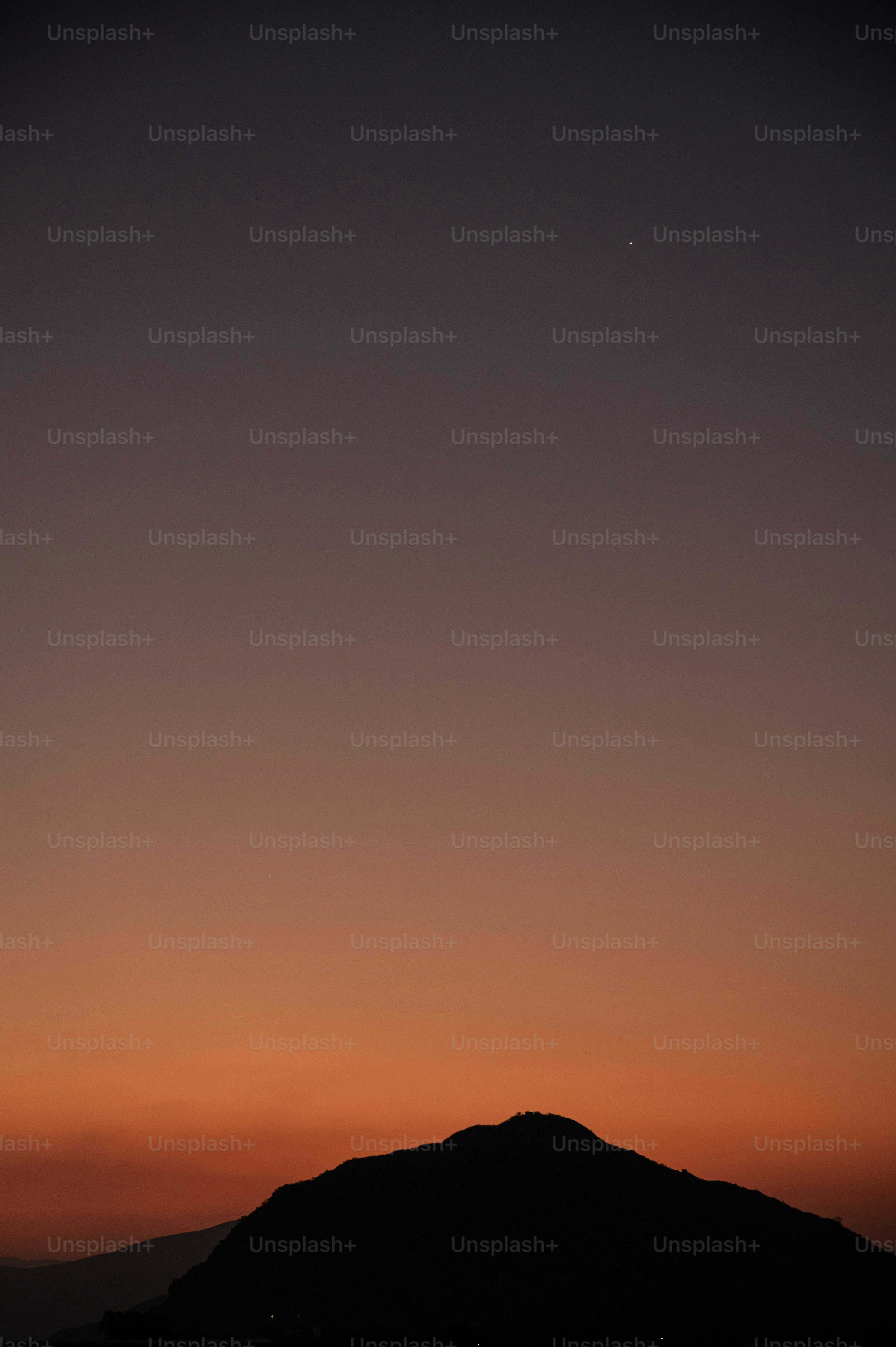 Couple enjoys a sunset view together. photo – Indigenous Image on Unsplash