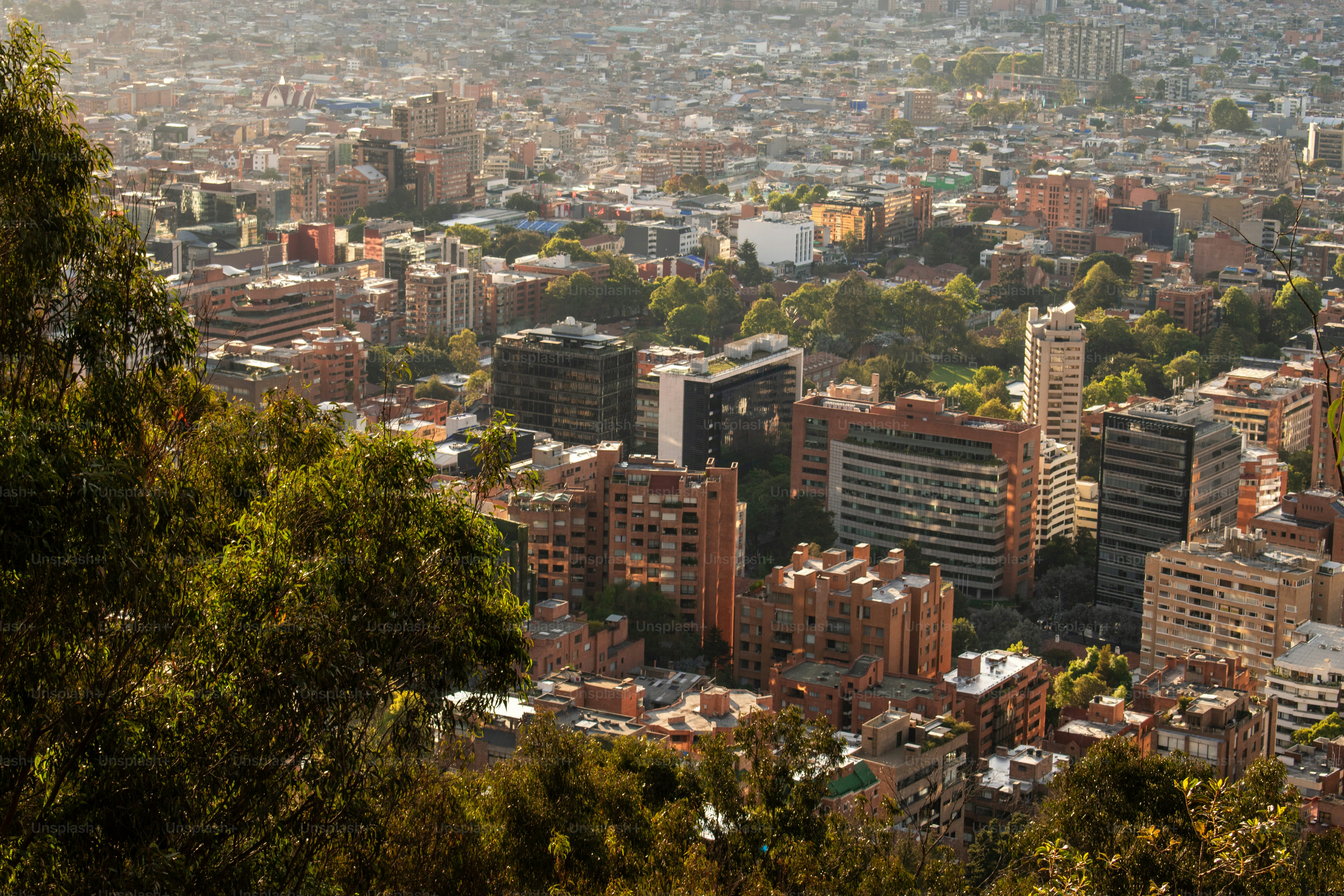 High angle view of Bogota city landscape at sunset, view from mountains ...