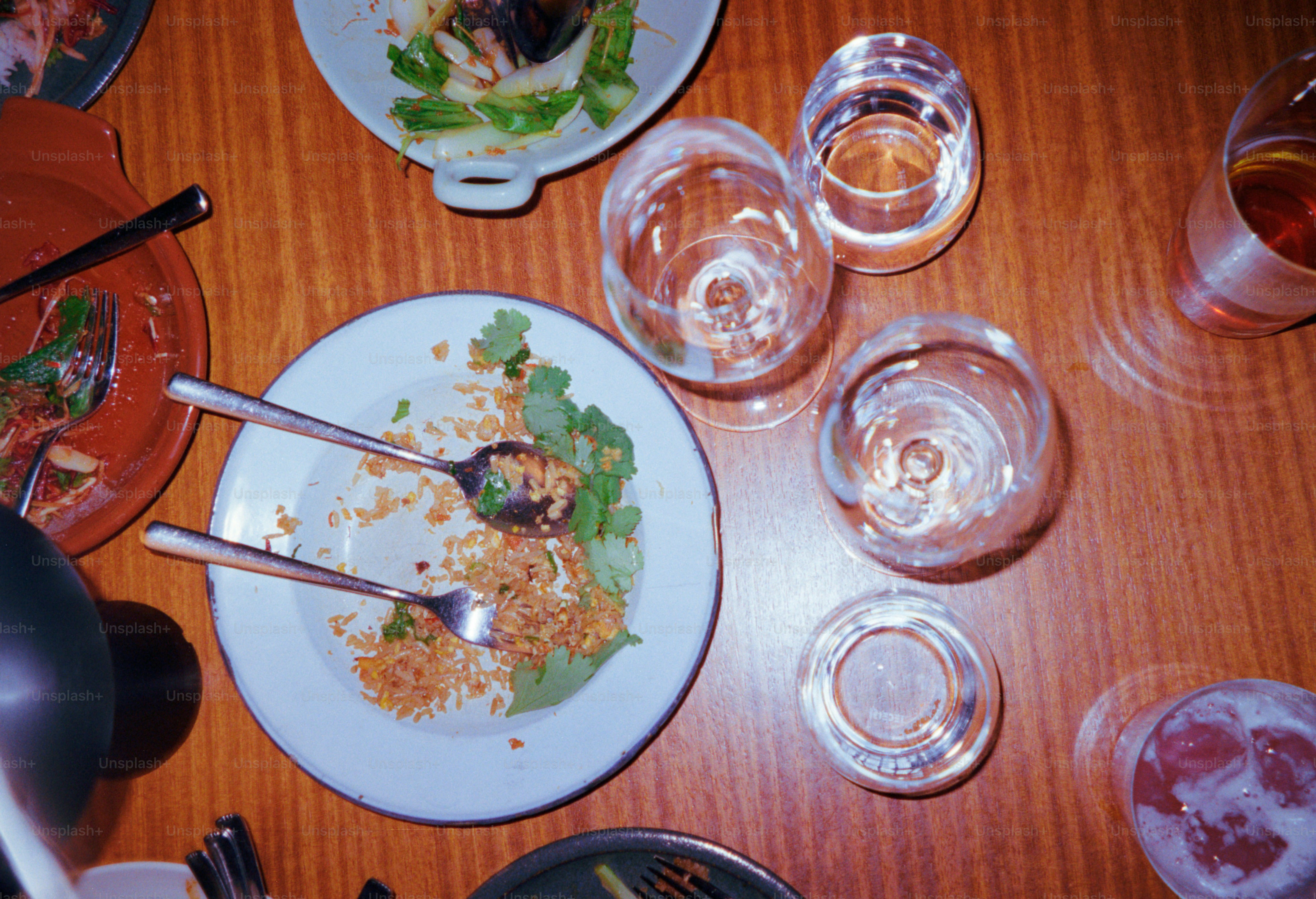 Empty plates and drinks signal the meal is over. photo – Sweden Image ...