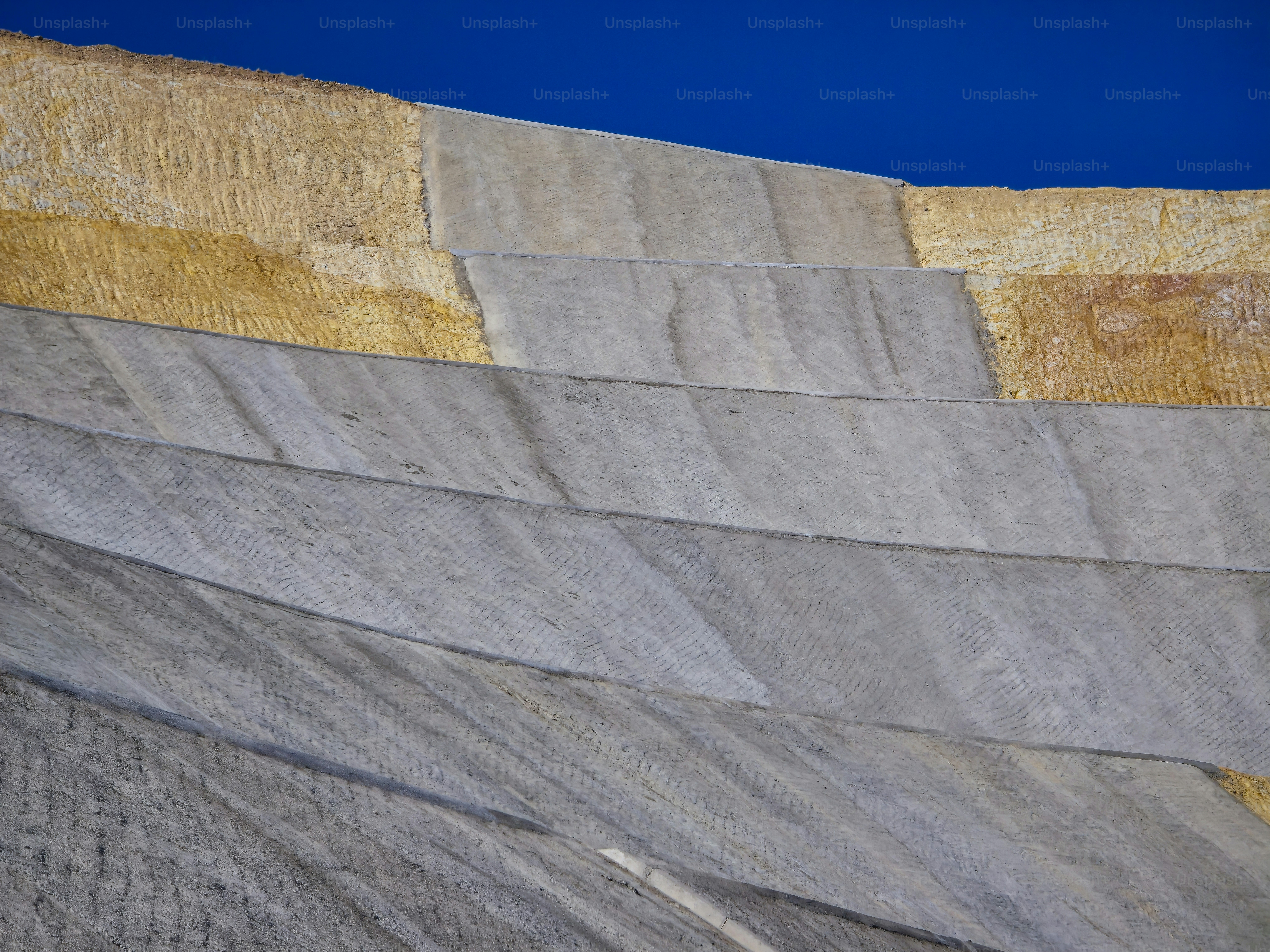Mine slope stabilization process with geosynthetics and shotcrete ...