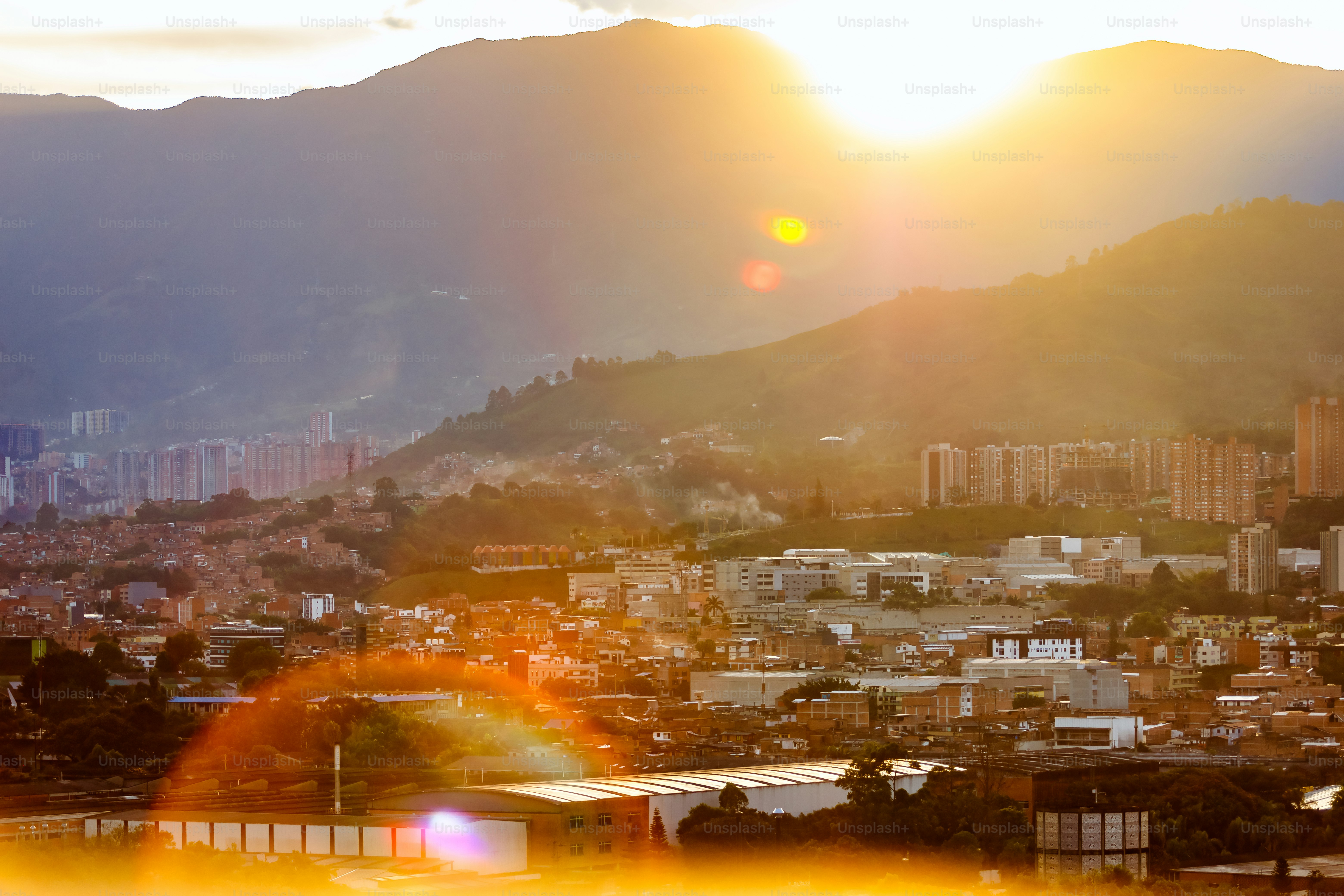 Panoramic of Medellin (Colombia) during sunset with hills in the ...
