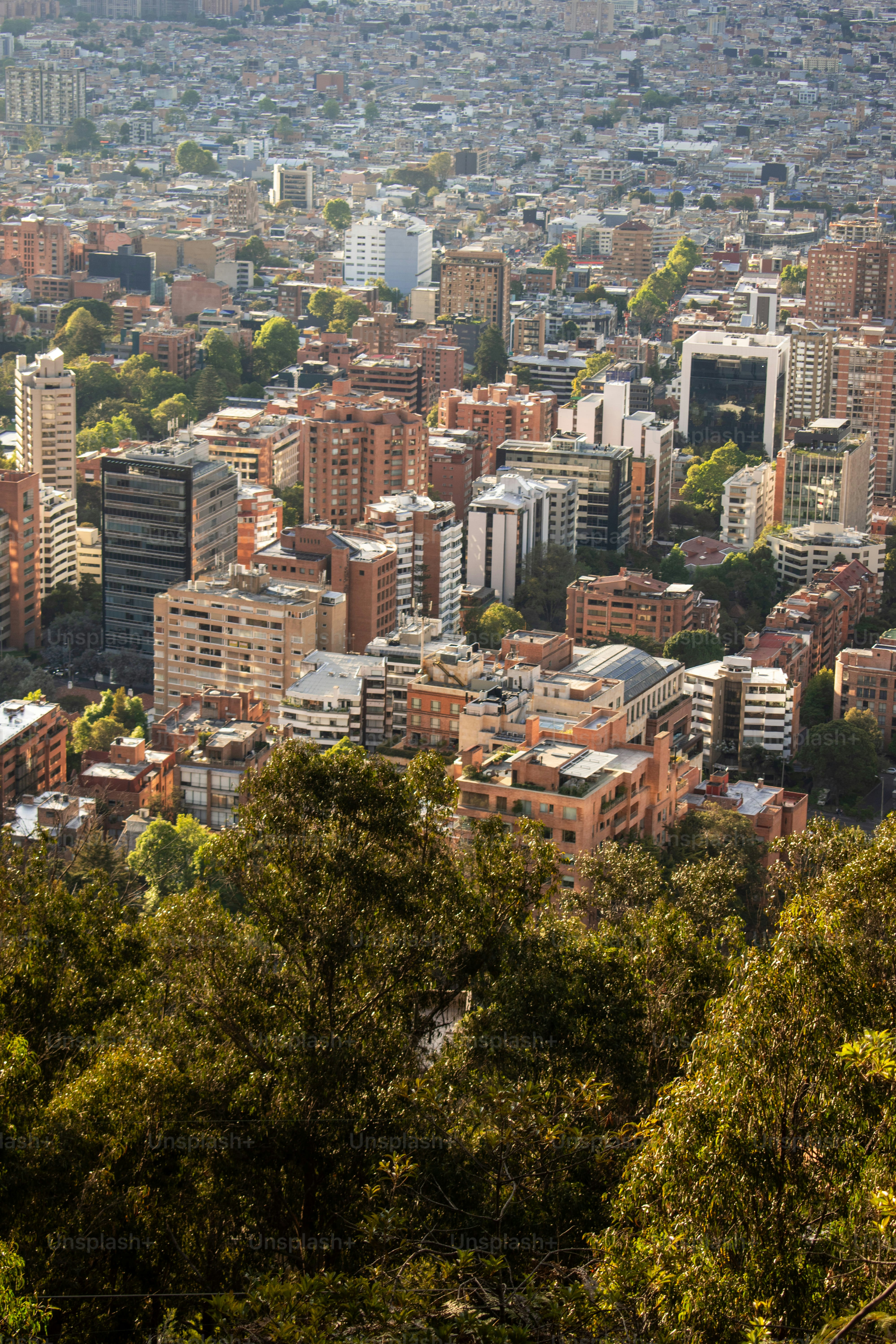 High angle view of Bogota city landscape at sunset, view from mountains ...