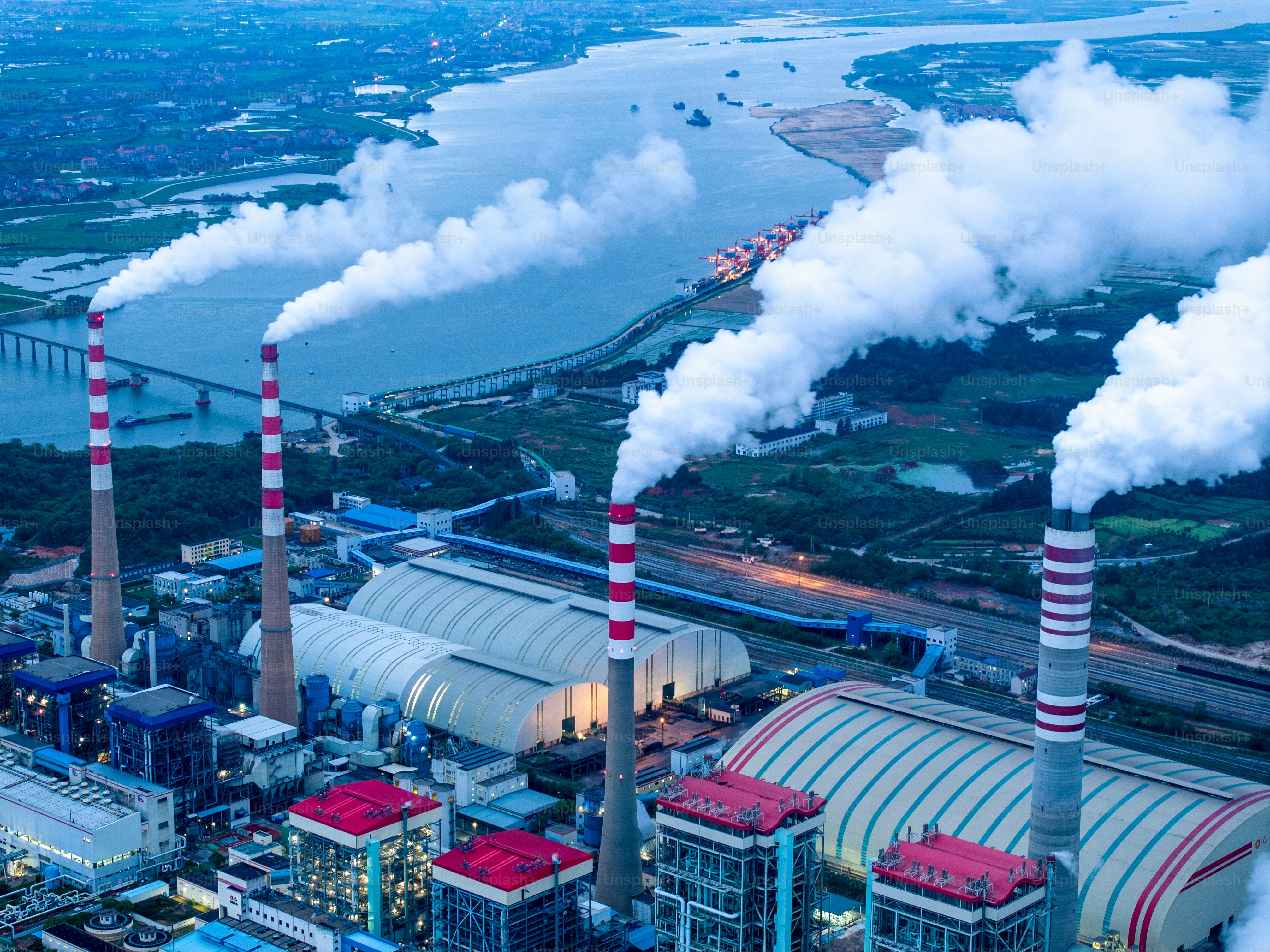 Aerial photography of large thermal power plant at night photo ...