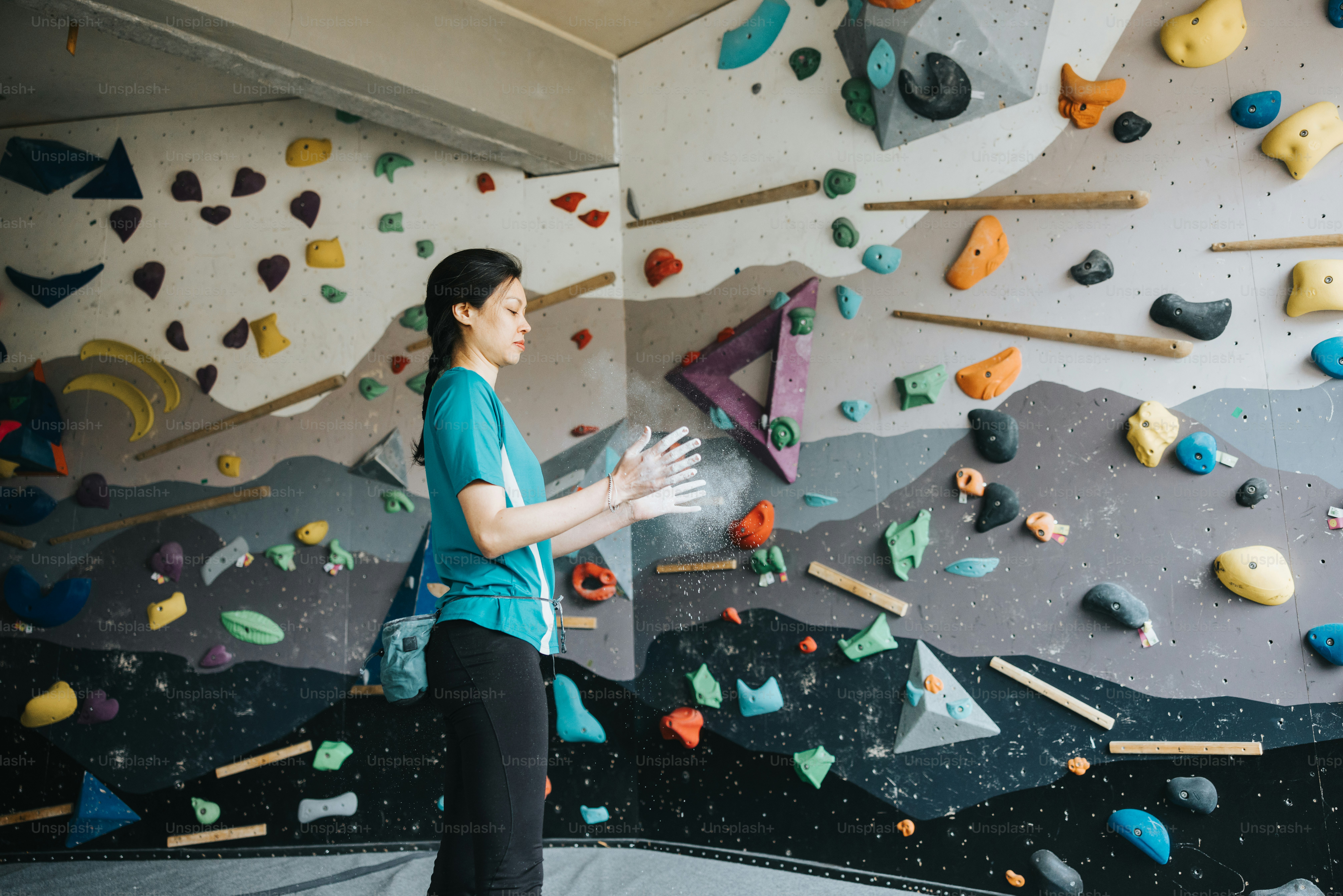 Japanese woman getting ready for a bouldering session in indoors ...