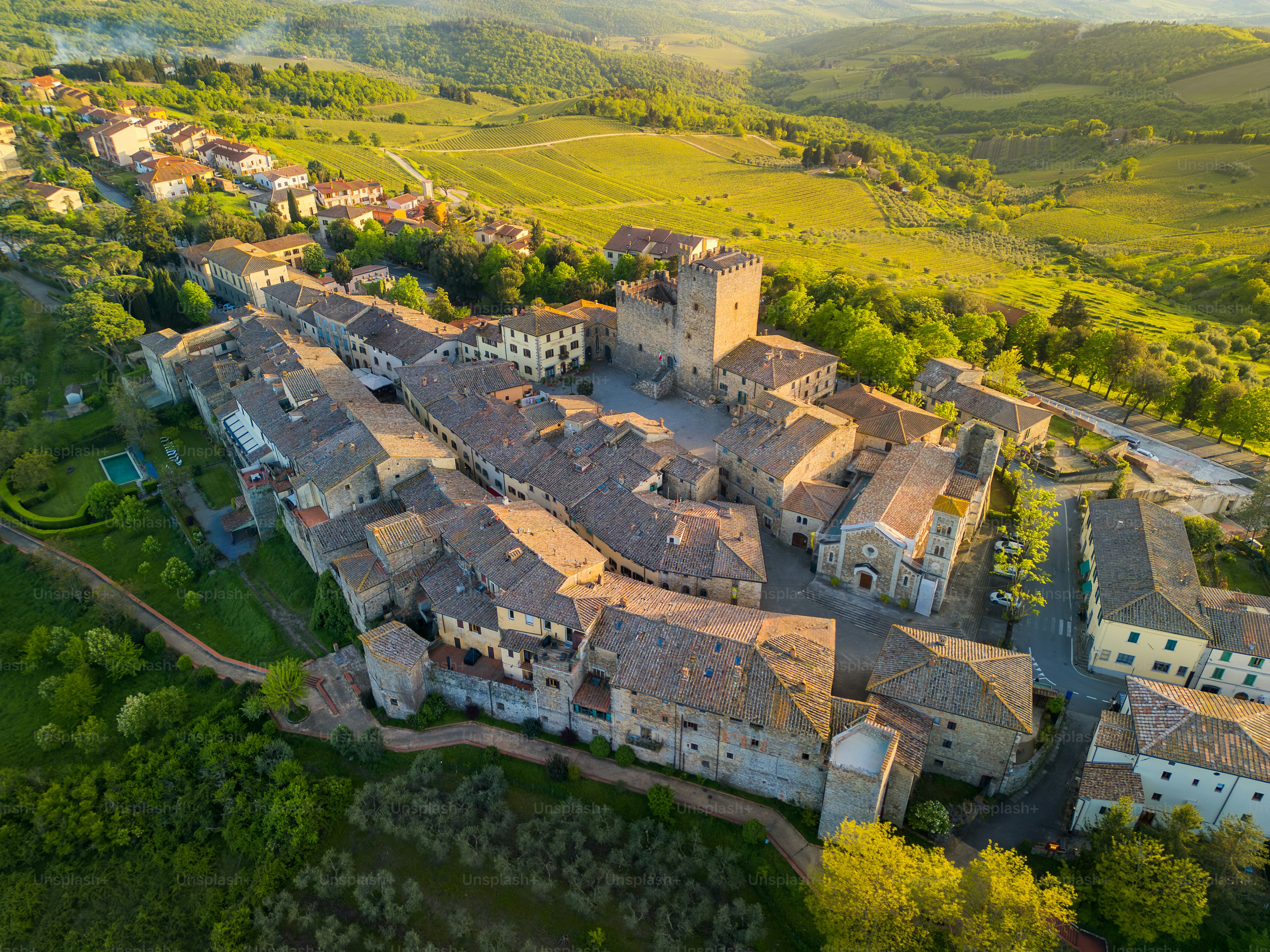 Aerial view of beautiful Italian old town at sunset, Castellina in ...
