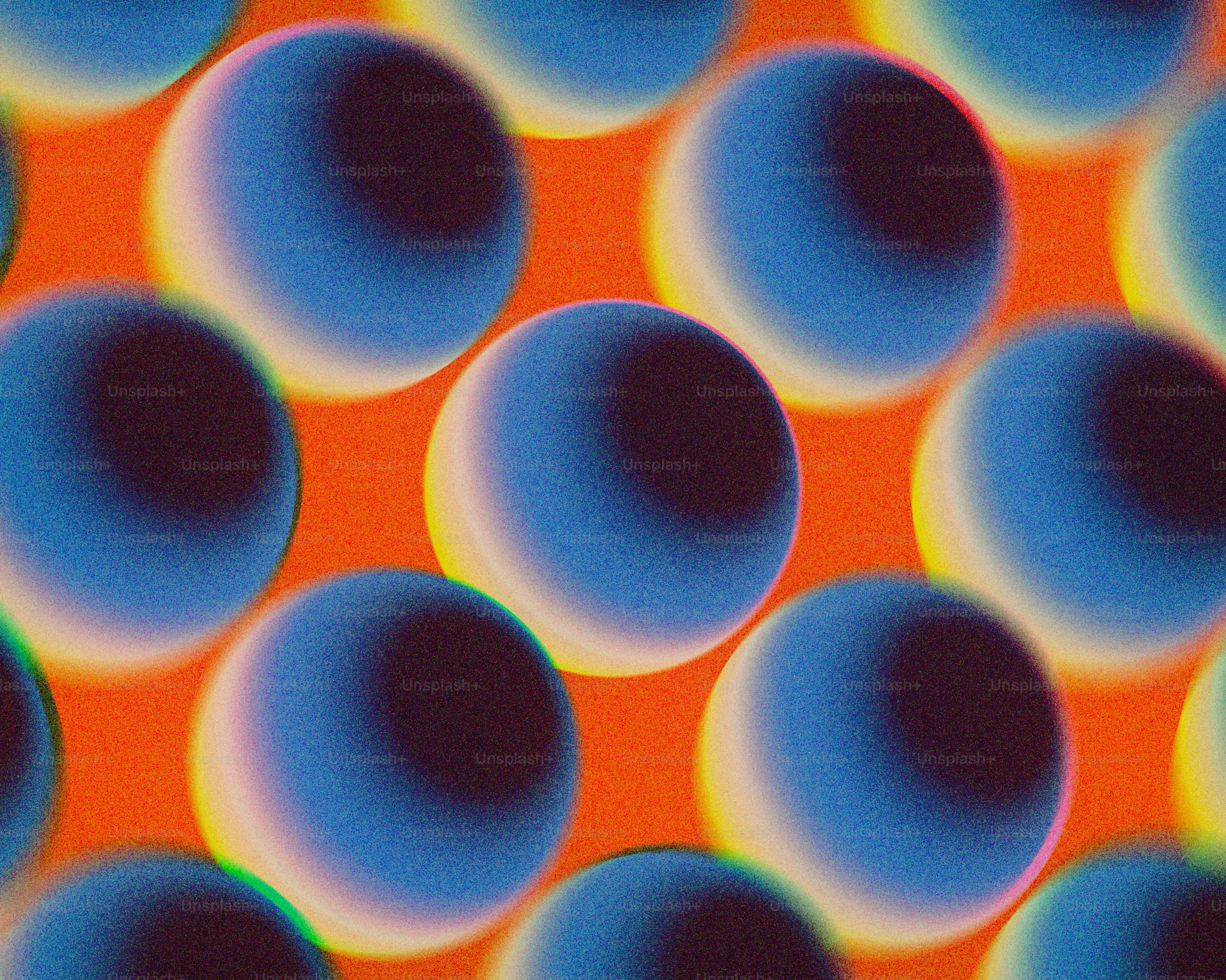 Blue spheres against a vibrant orange background. photo – Retro Image ...