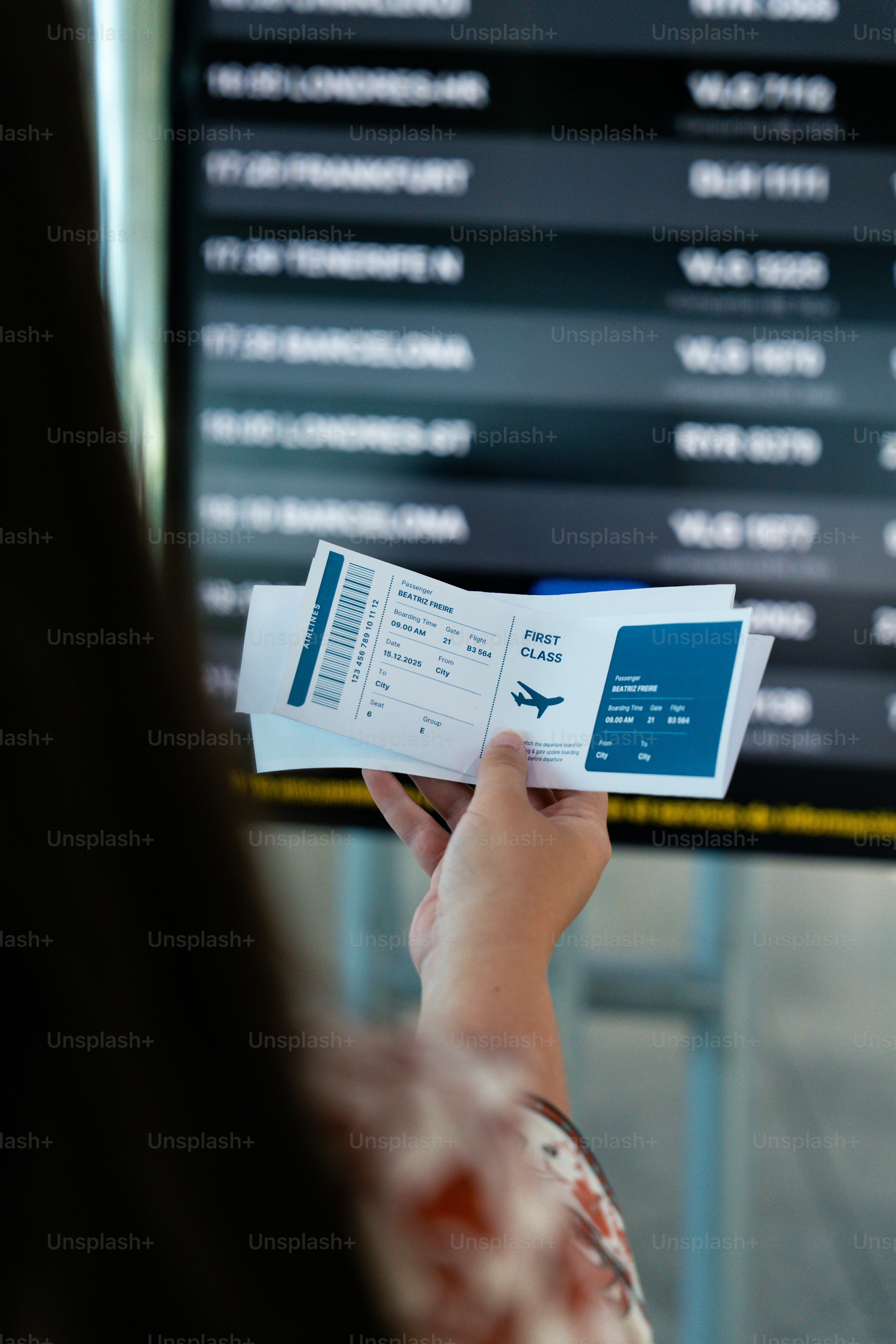 Person holding first class tickets at airport photo – Travel Image on ...
