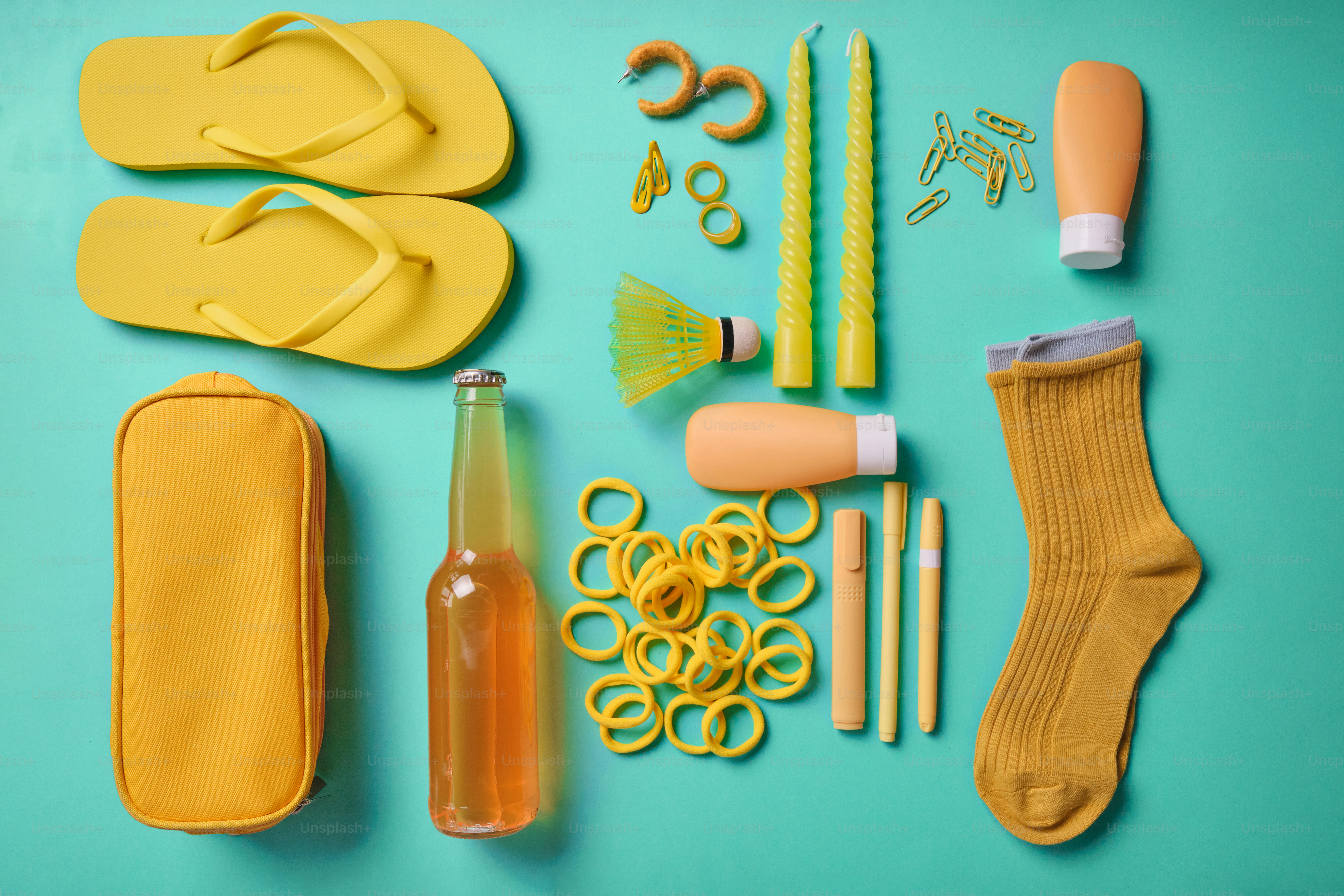 Various objects arranged on a teal background photo – Background Image ...