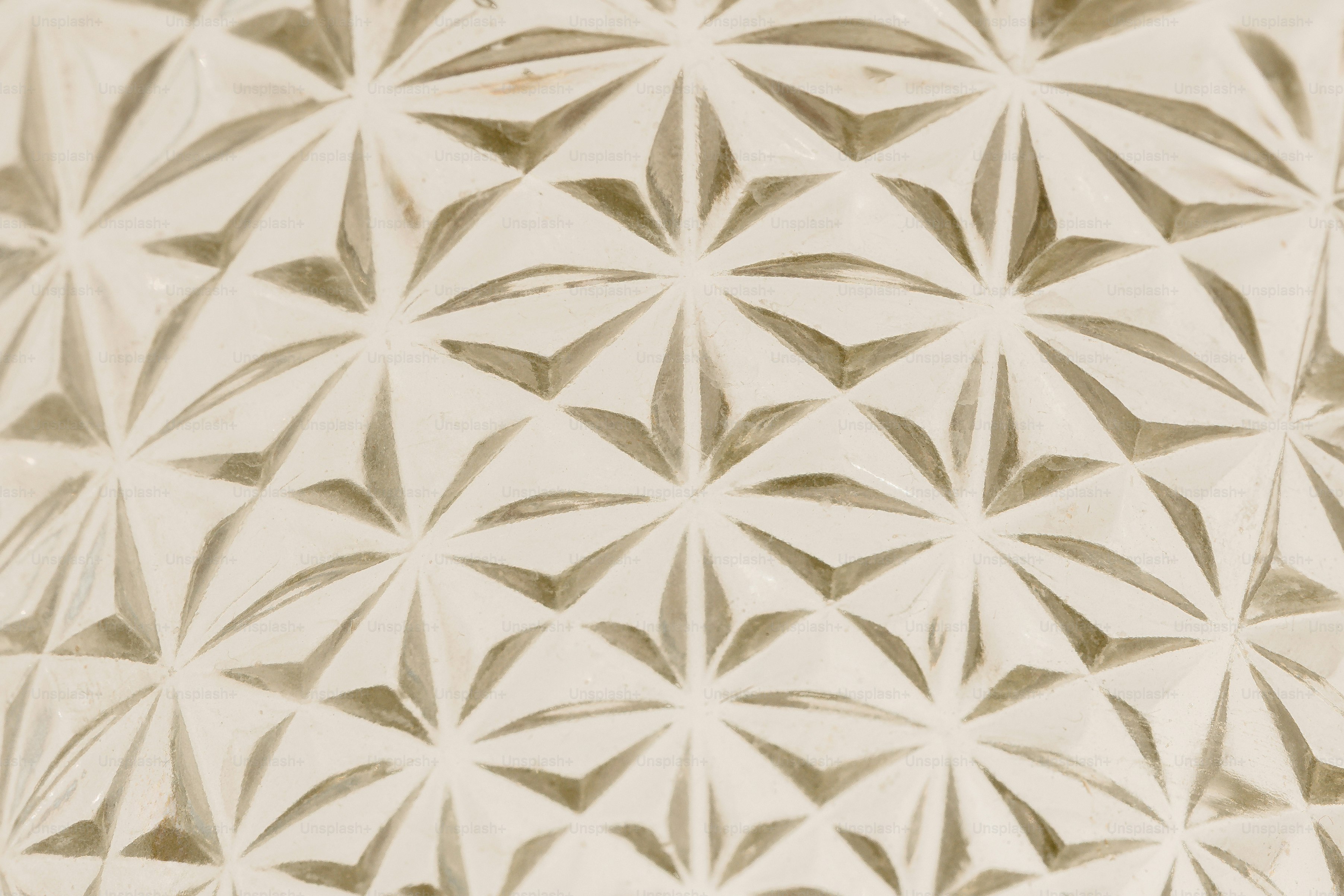 Geometric star pattern on textured surface photo – Wallpaper Image on ...