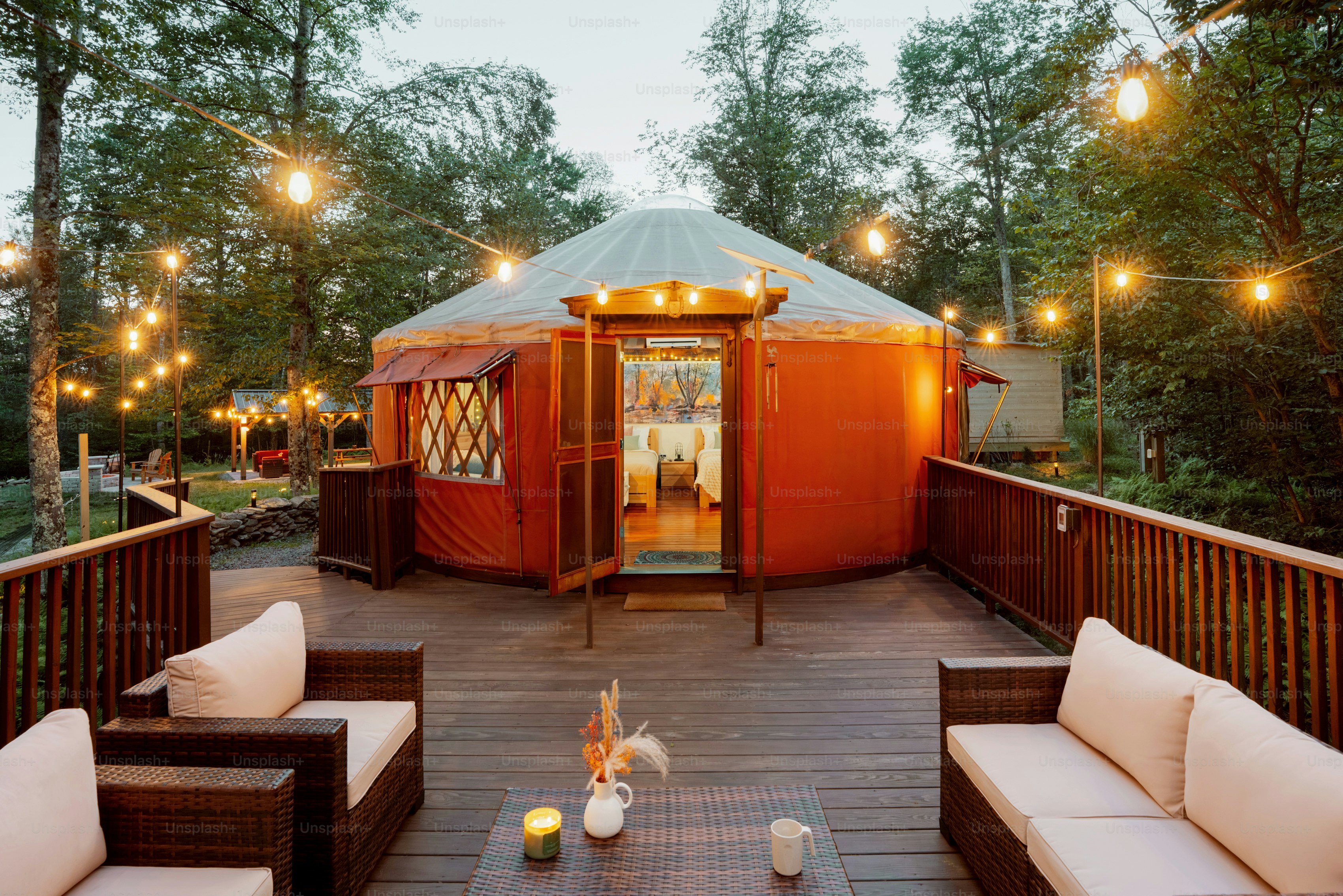 Cozy yurt with outdoor seating and string lights photo – Forest Image ...