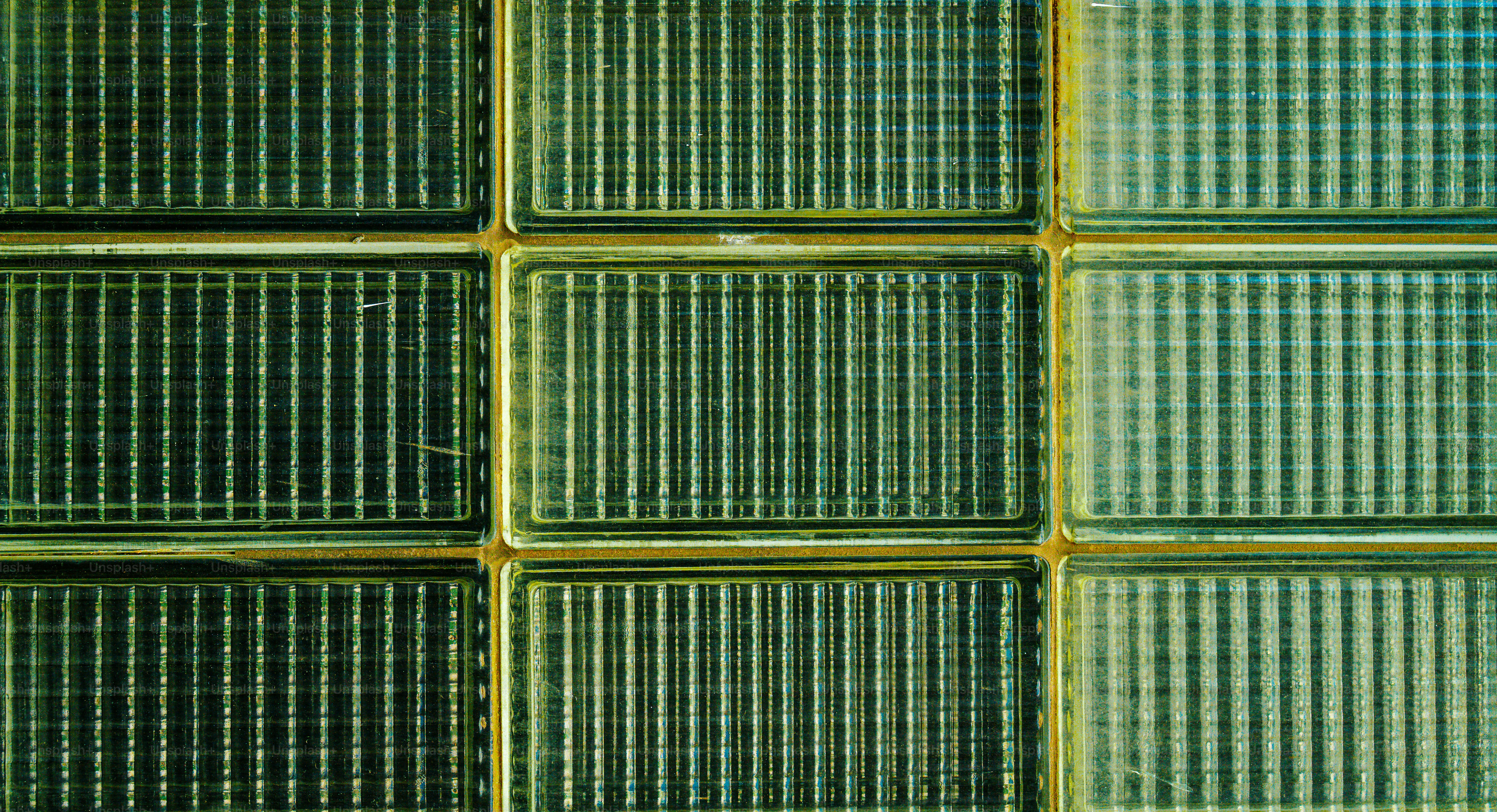 Close-up of glass blocks with vertical lines photo – Pattern Image on ...