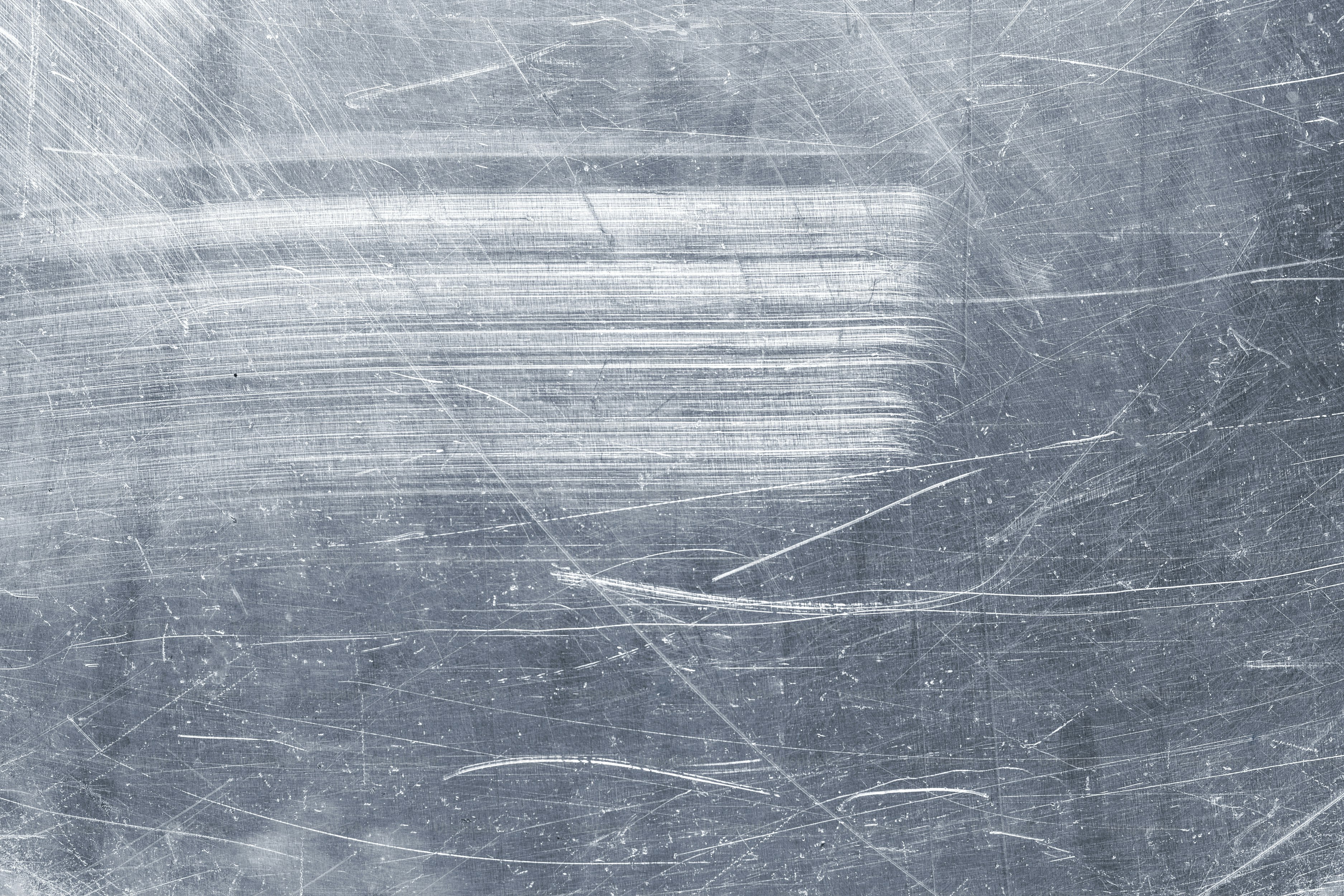 Gray iron plate with scratches, metal texture with chrome gloss photo ...