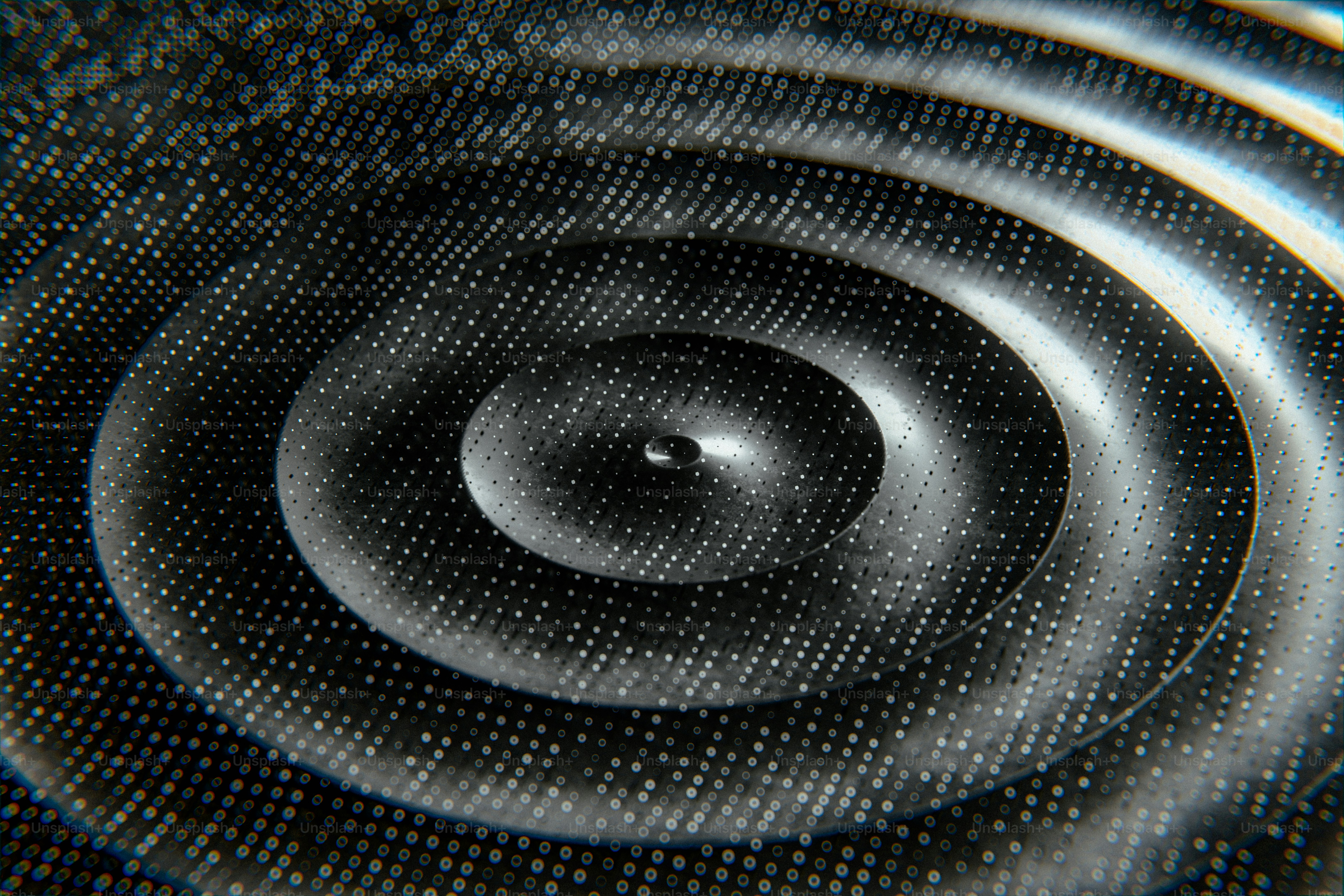 Iridescent concentric waves with a central ripple effect photo ...