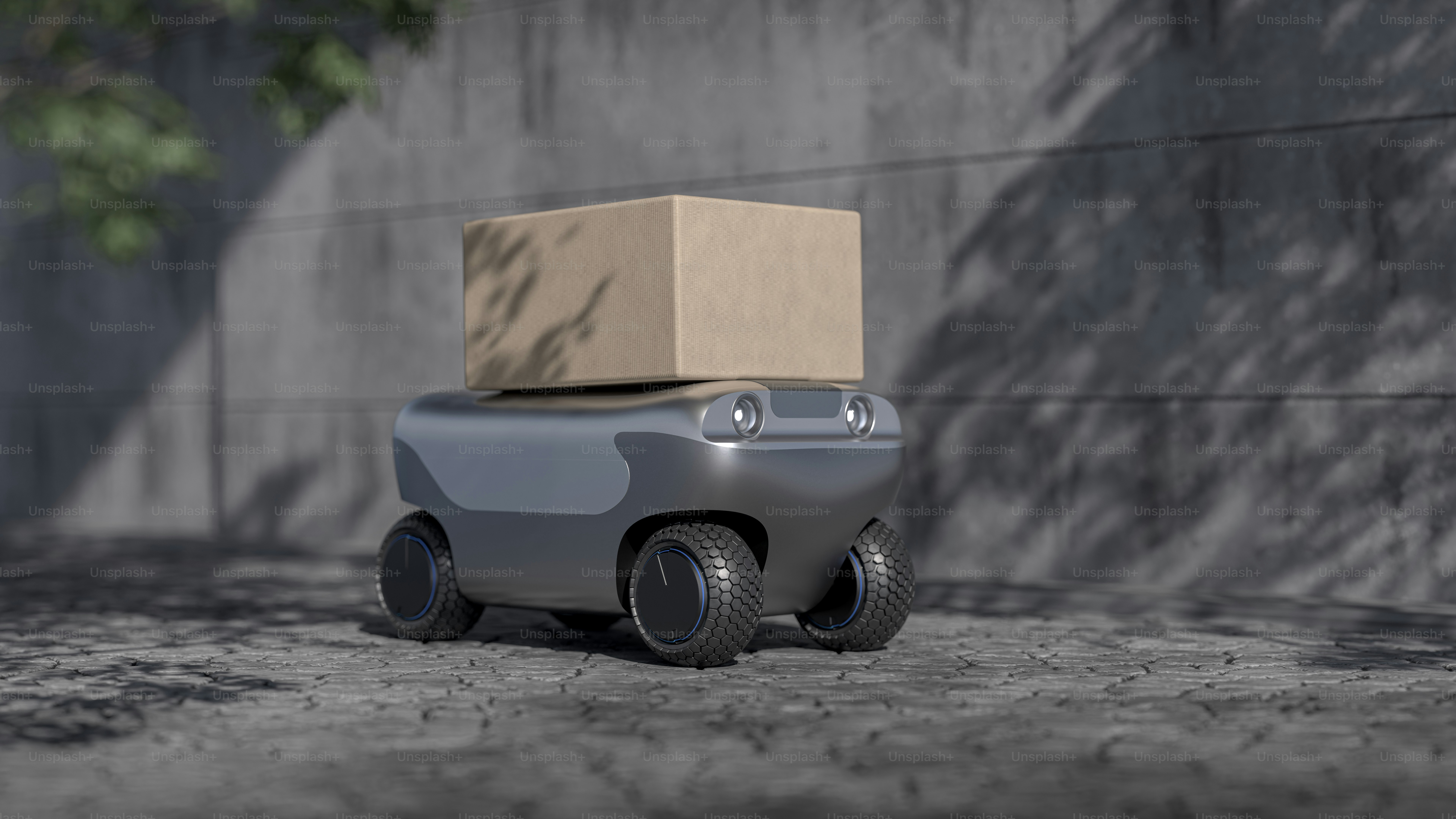 A small delivery robot carries a package on a sidewalk. photo – Robot ...