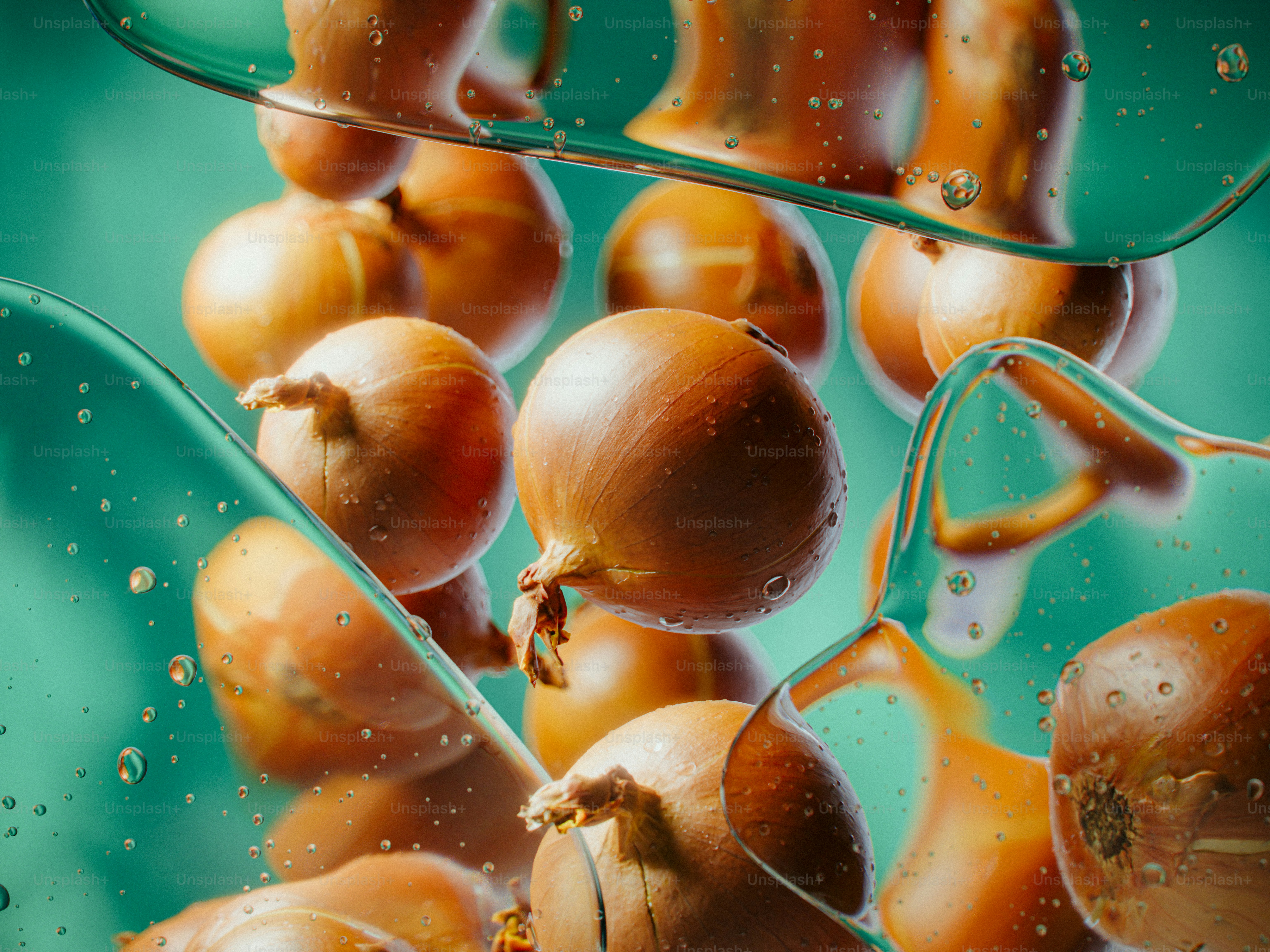 Onions submerged in clear liquid with bubbles. photo – Wallpaper Image ...