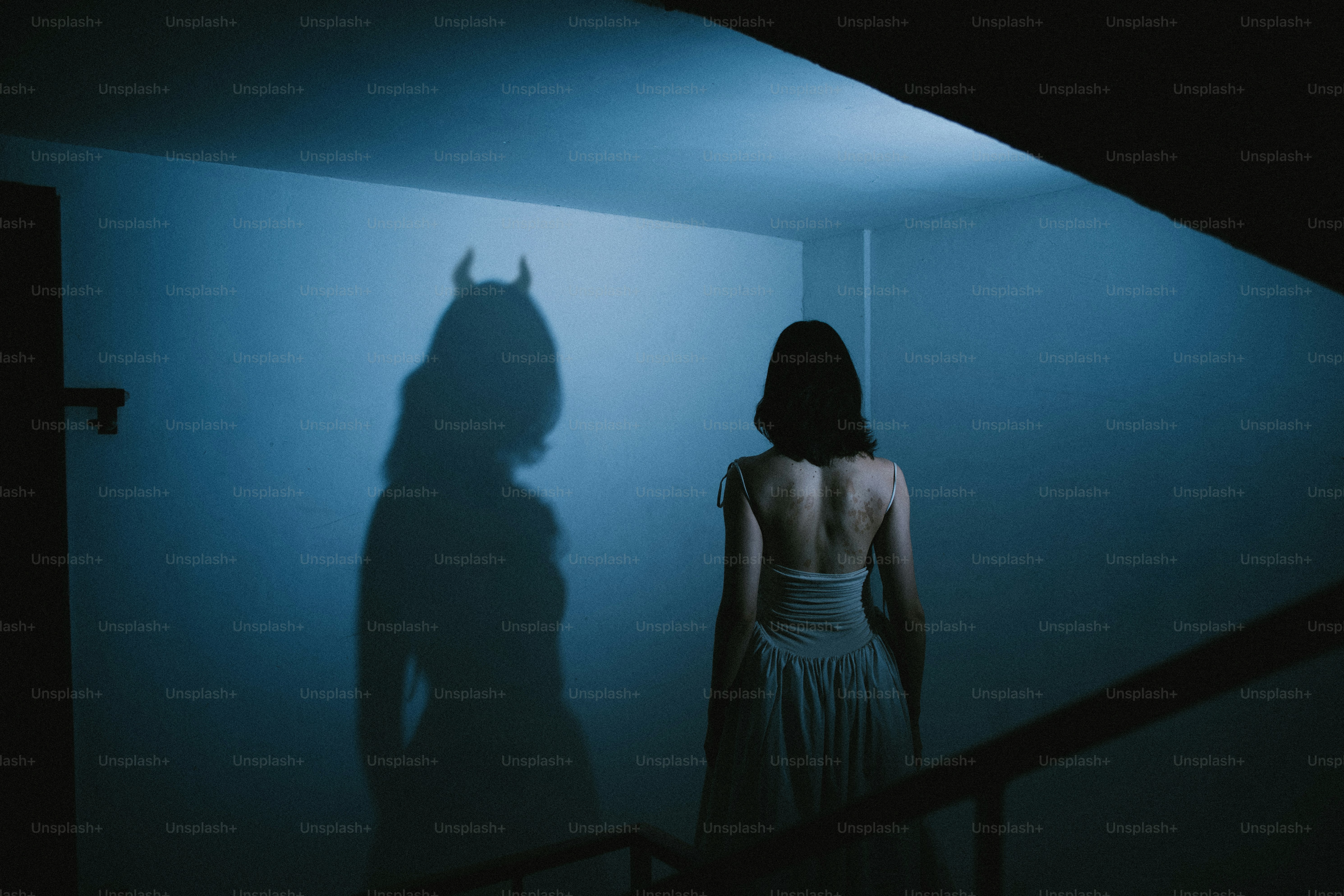 Woman on stairs with devil shadow photo – Dark Image on Unsplash