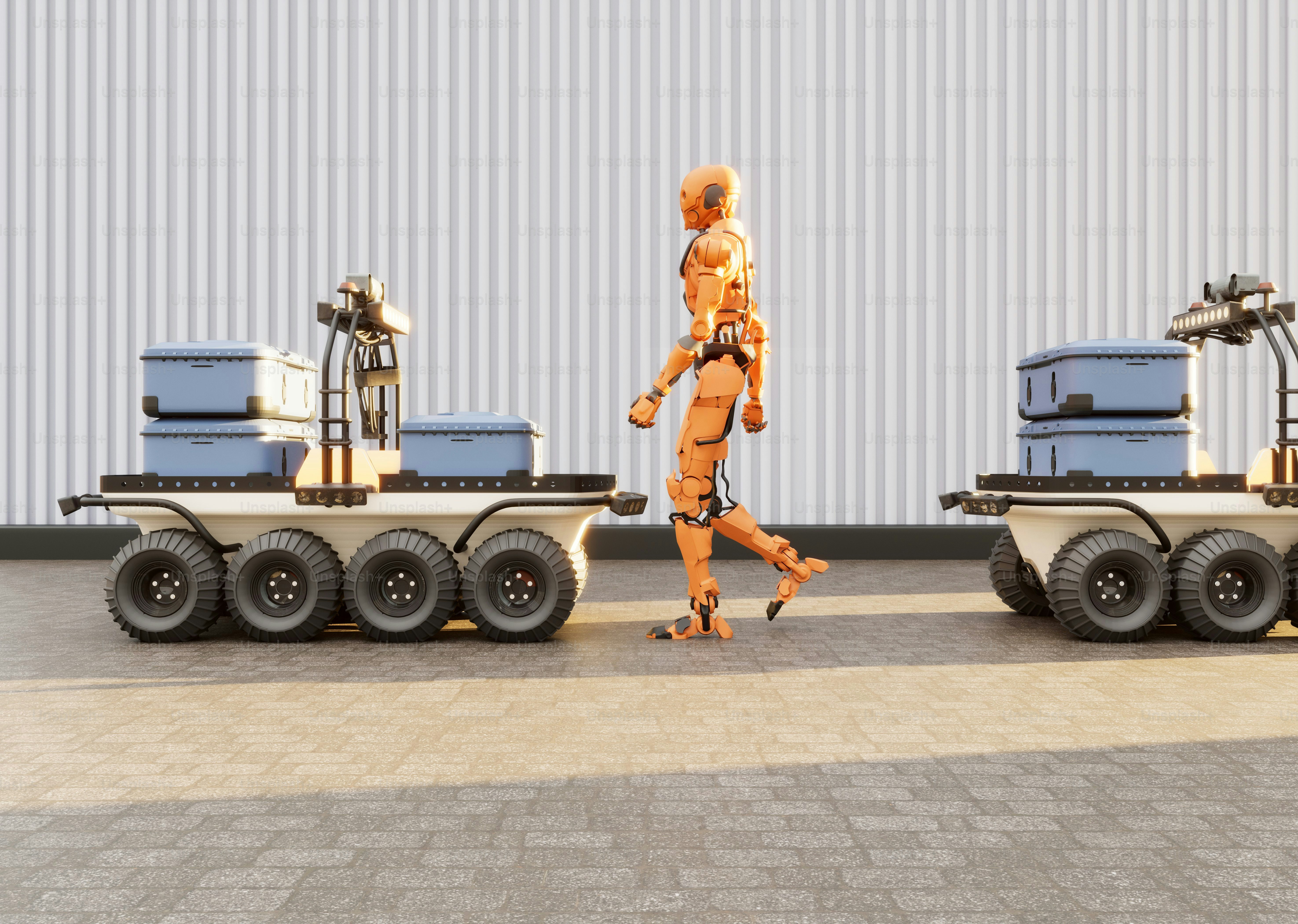 Mannequin walks between two autonomous robots carrying boxes. photo ...