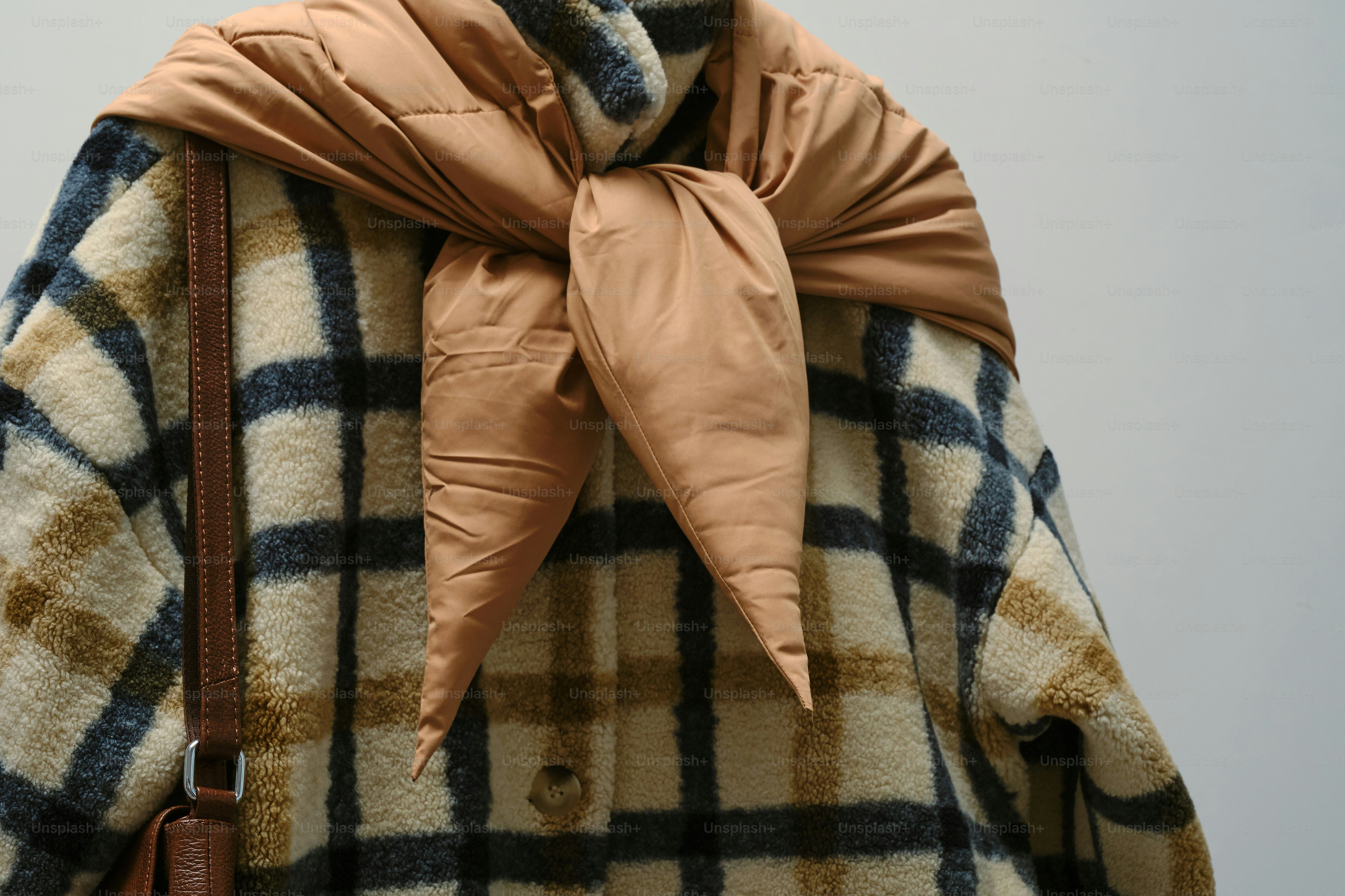 Plaid coat with a tan scarf draped over shoulders. photo – Woman Image ...