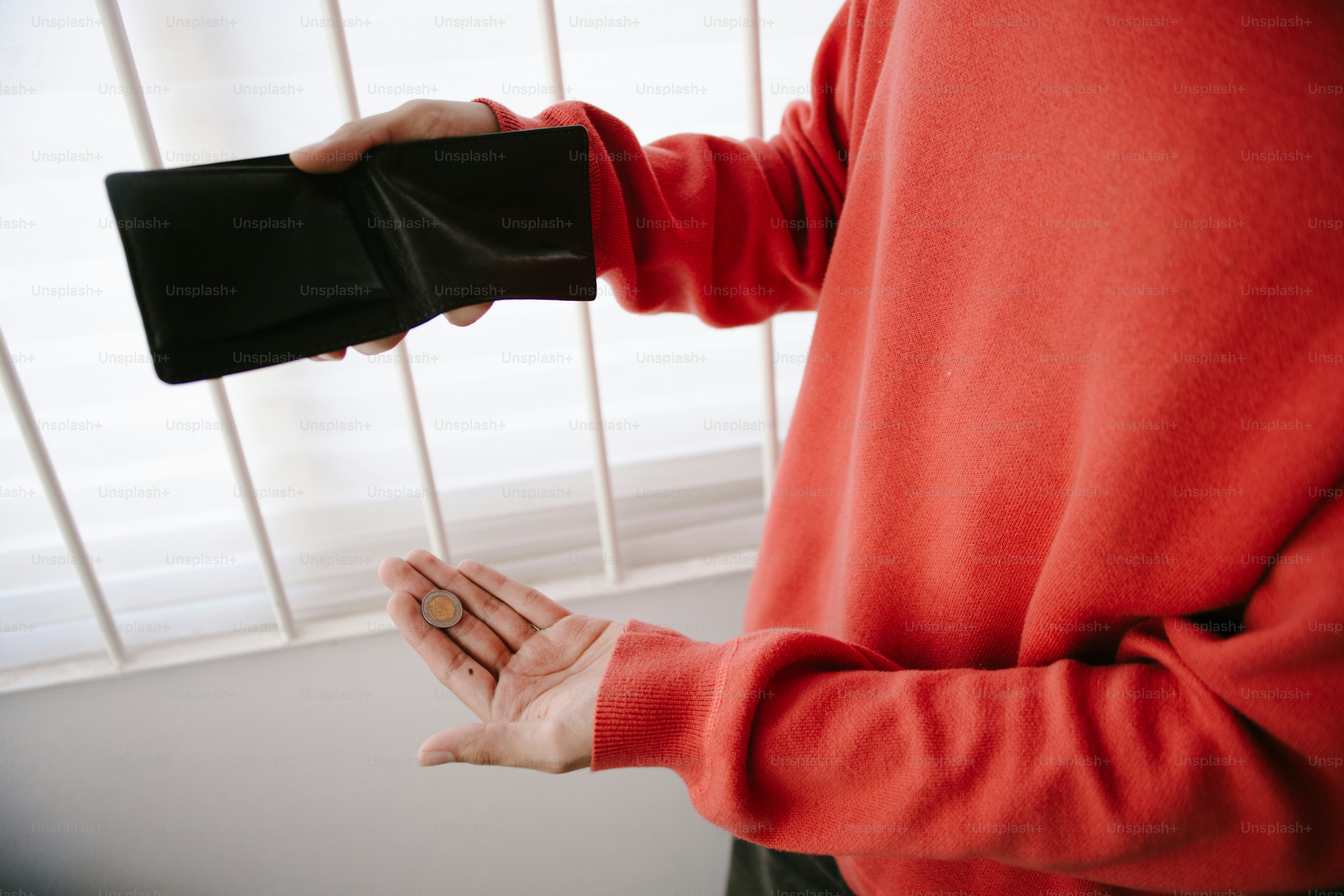 Person showing empty wallet and one coin photo – Poverty Image on Unsplash